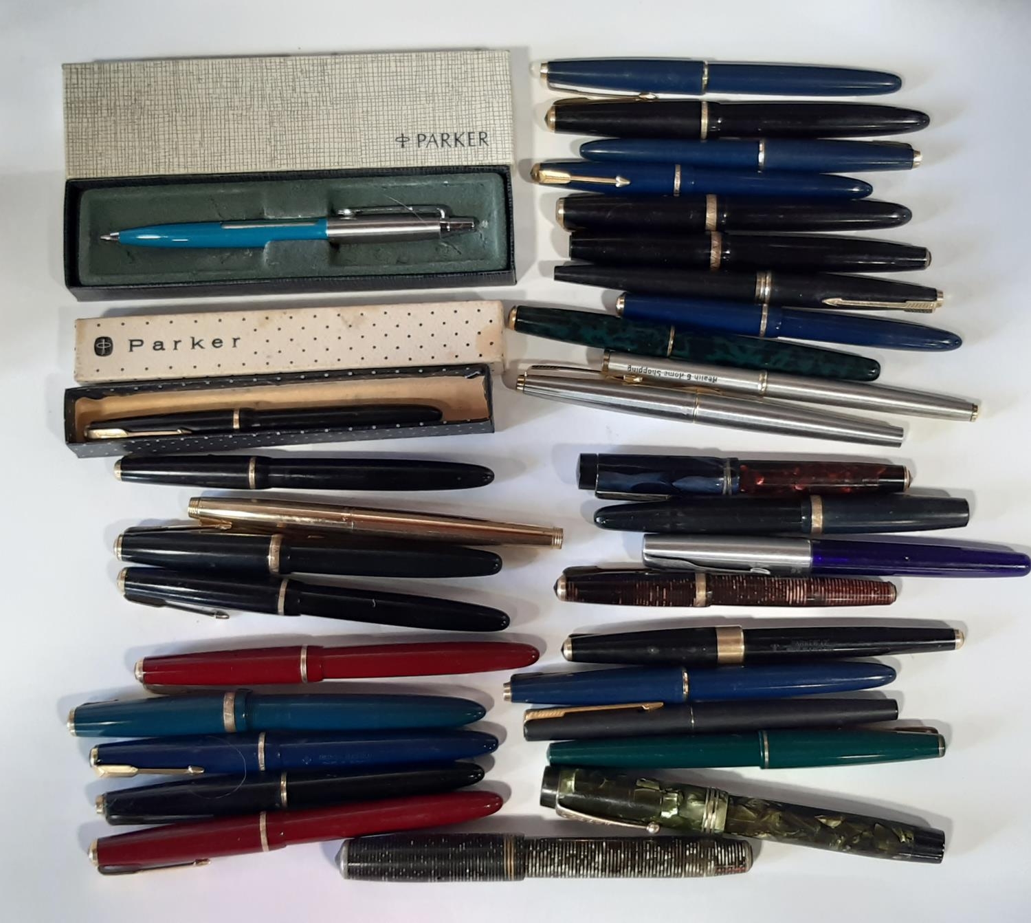 A large collection of vintage Parker fountain pens, to include duofold ...