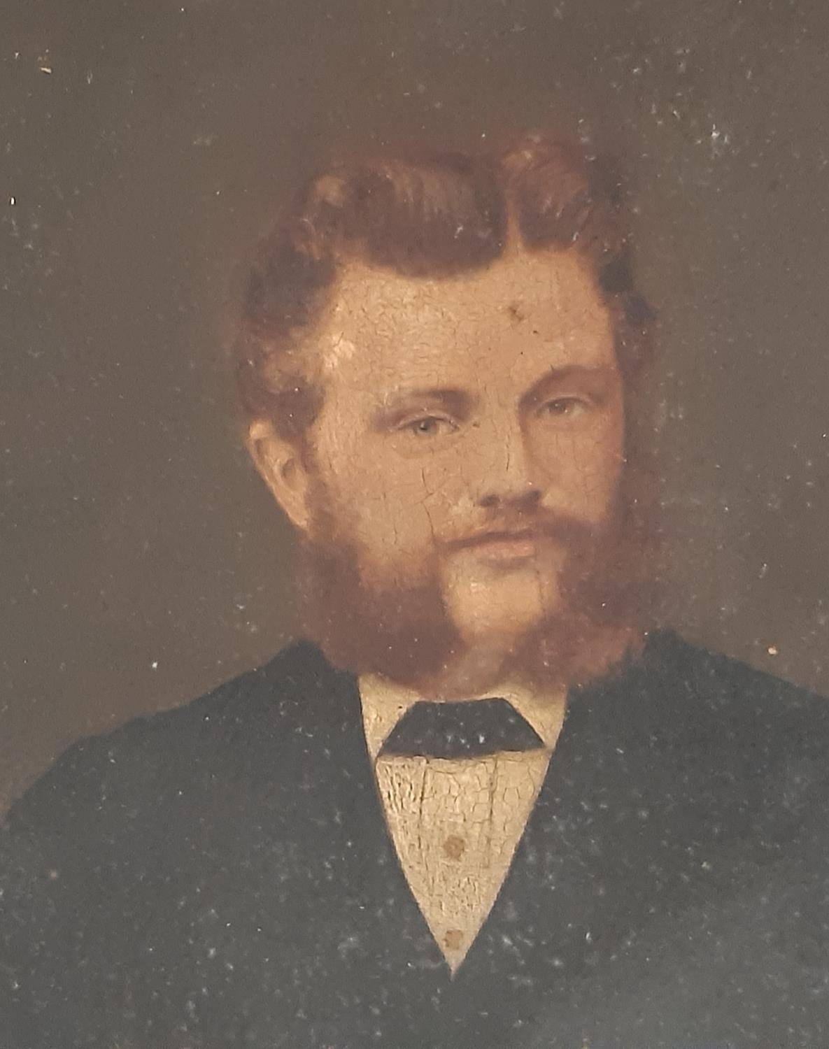 Three Victorian portraits of two gentlemen and a seated lady wearing a ...