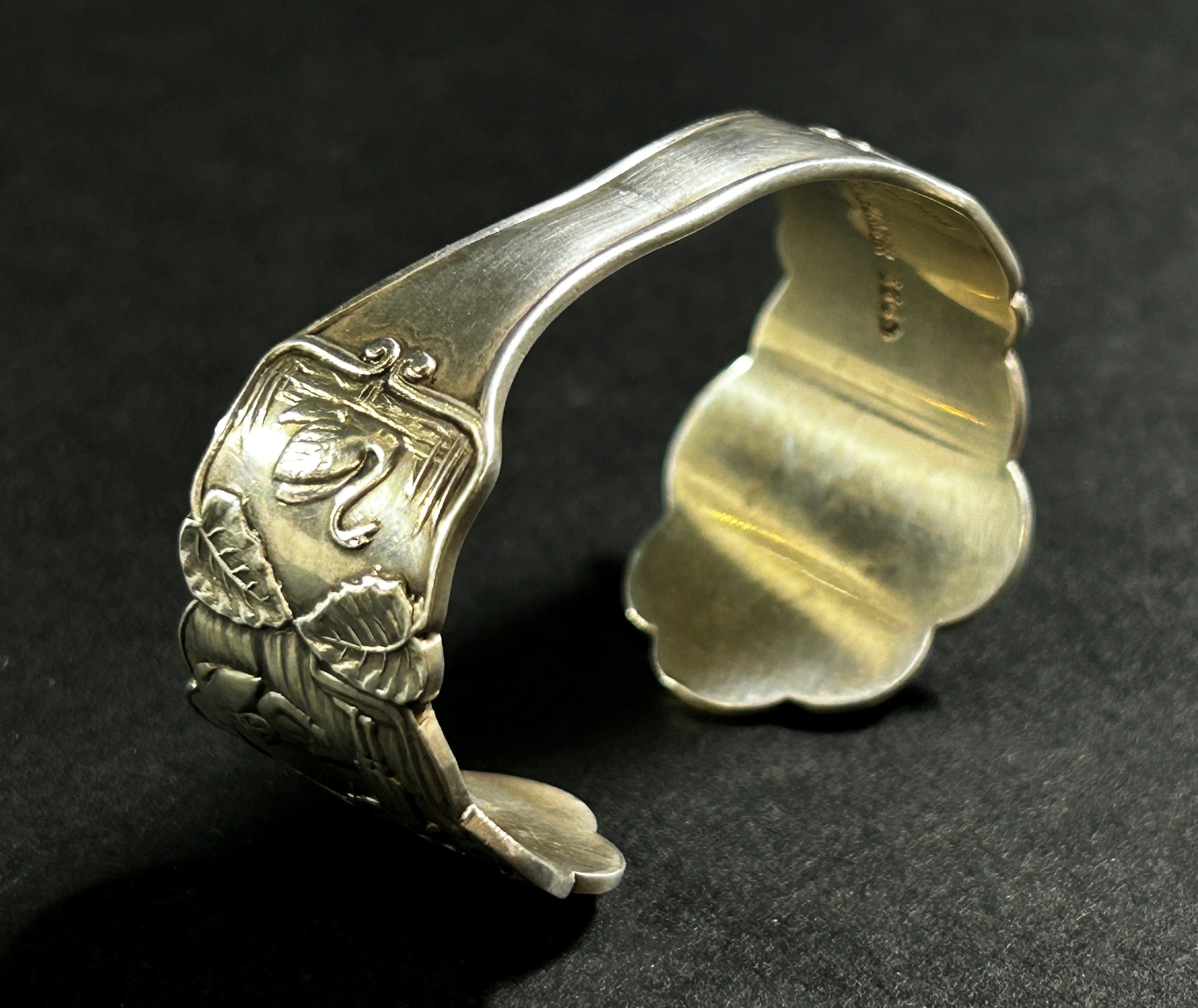 An unusual Fritz Heimburger (Danish) silver scarf clasp with a bed ...