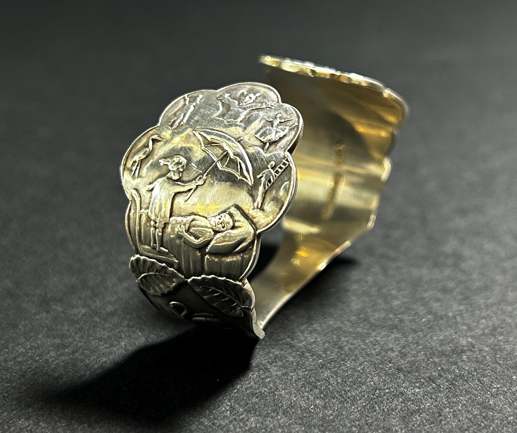 An unusual Fritz Heimburger (Danish) silver scarf clasp with a bed ...