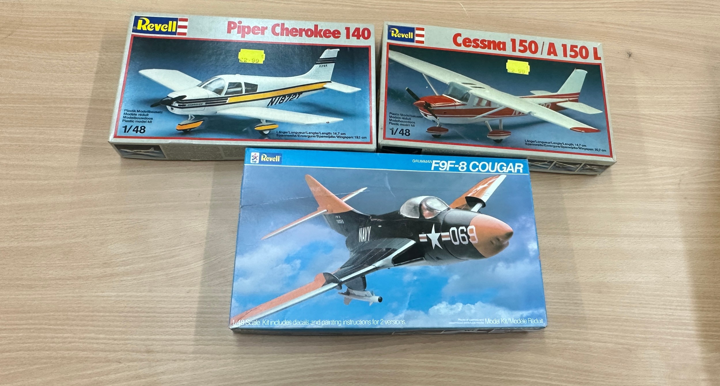 Three Revell air craft model kits to include ' Cessna 150 A150L ...