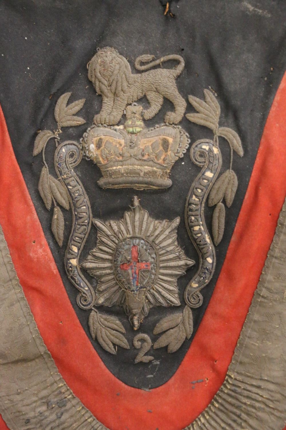 Two British Army black cloth panels with bullion wire crest, with ...