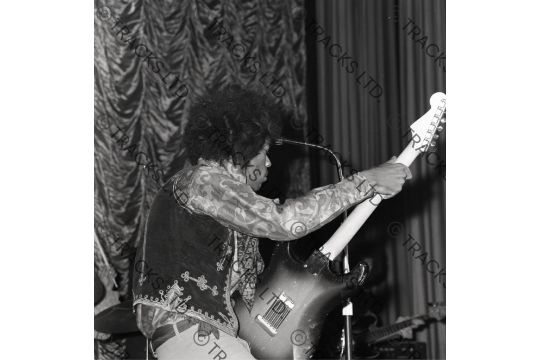 ˑ A pair of black and white negatives bearing images of Jimi Hendrix ...