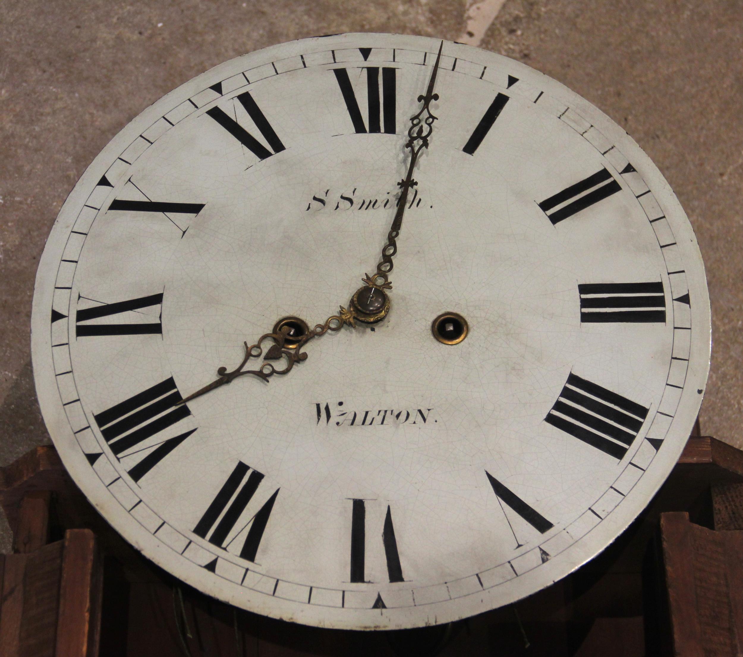 An oak cased eight day tavern or railway clock, signed S Smith, Walton ...