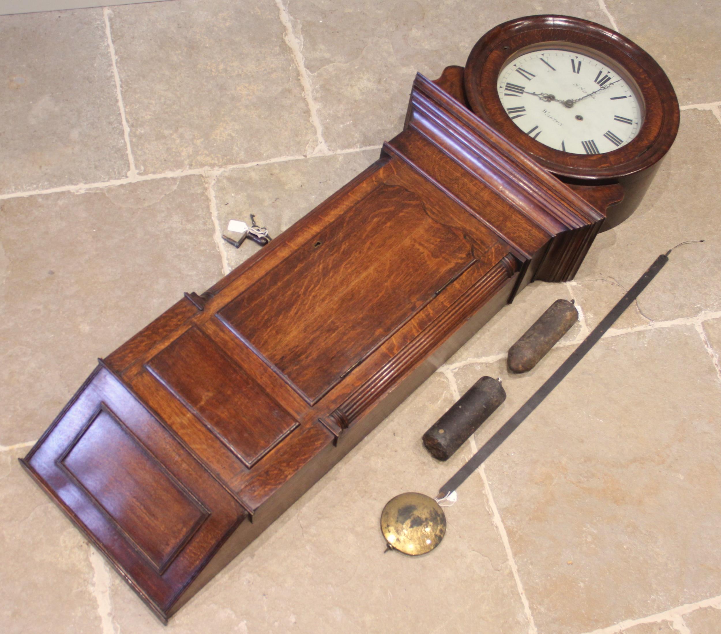 An oak cased eight day tavern or railway clock, signed S Smith, Walton ...