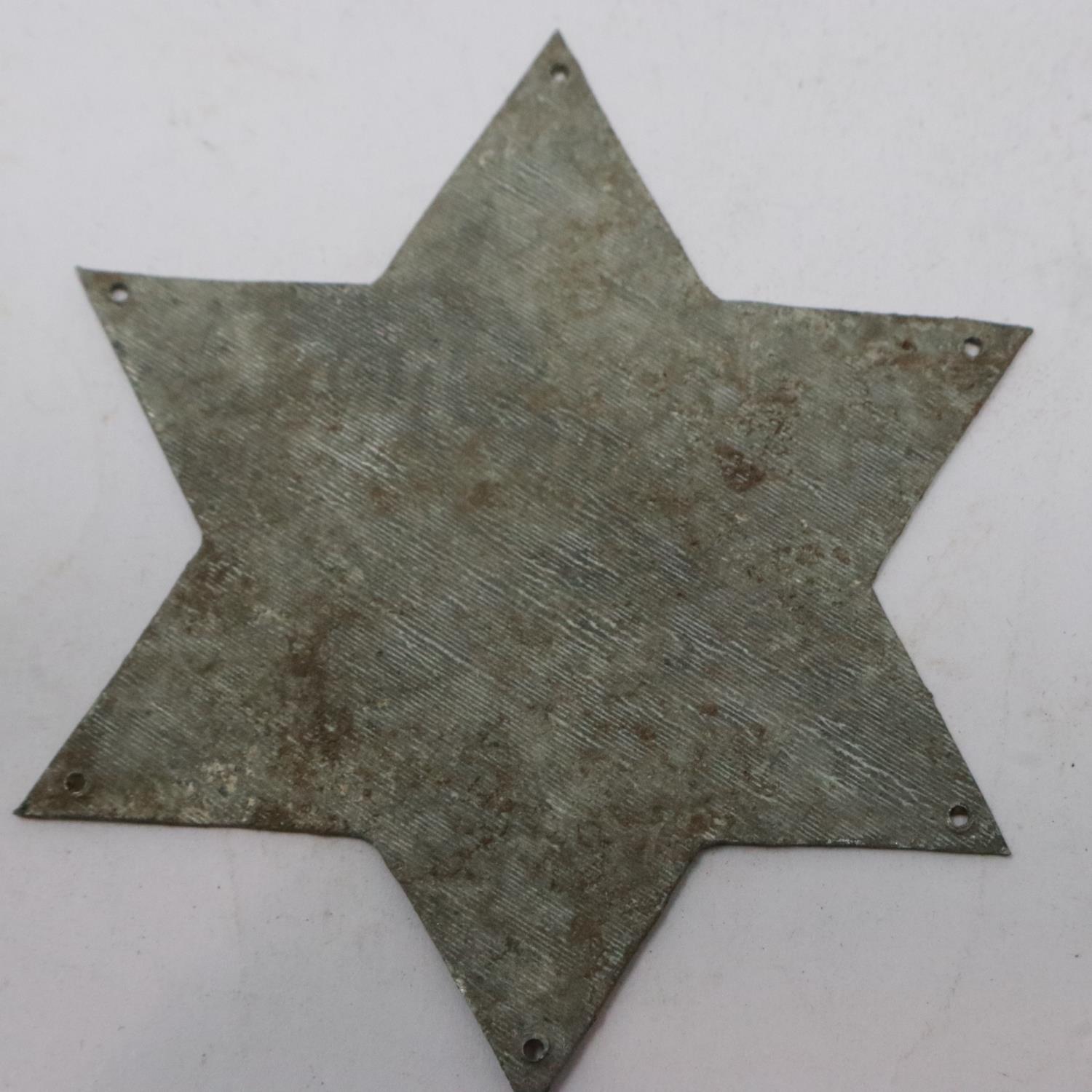 Third Reich period Jewish Ghetto Police badge, crudely made from tin ...