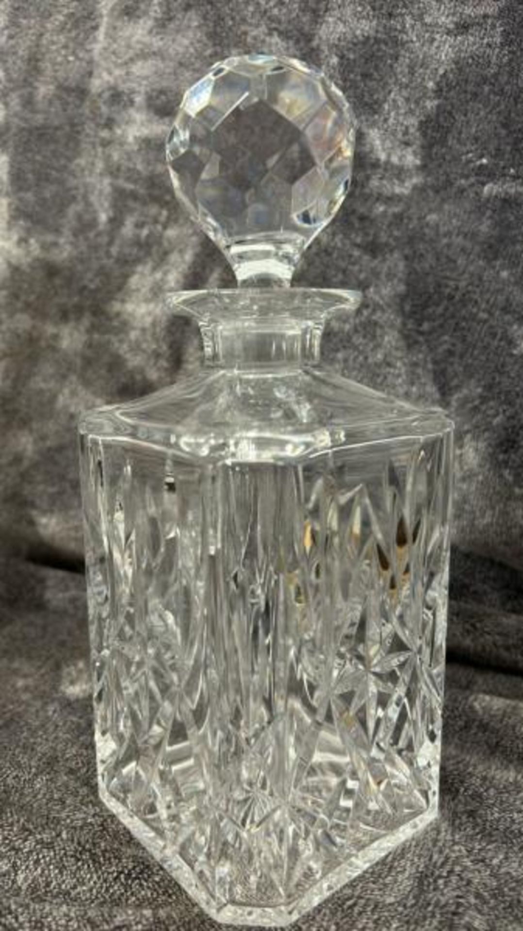 Three square cut glass, lead crystal decanters including one pair, 26cm ...