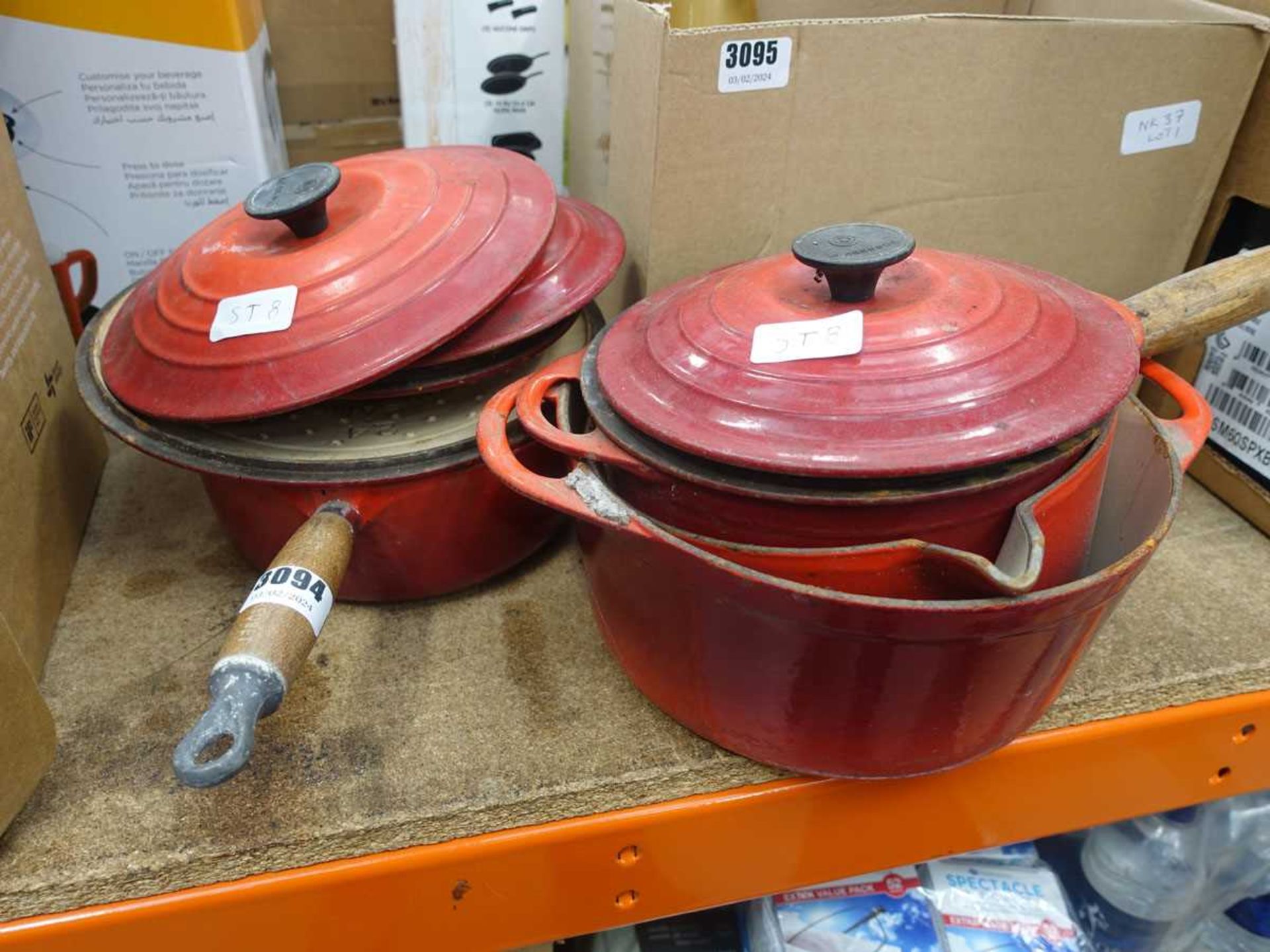 Stack of Le Creuset cooking pots