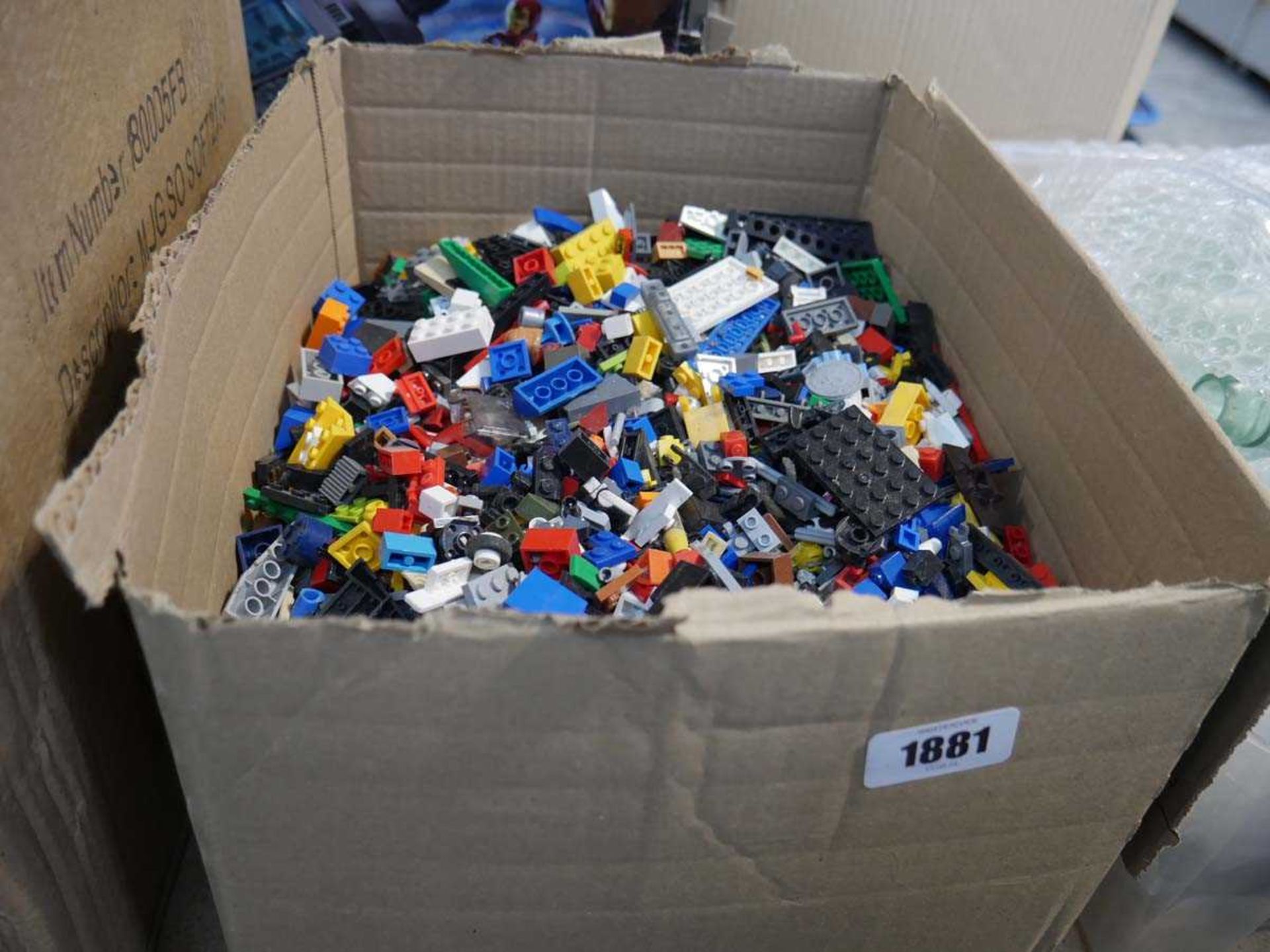 Box containing loose Lego pieces