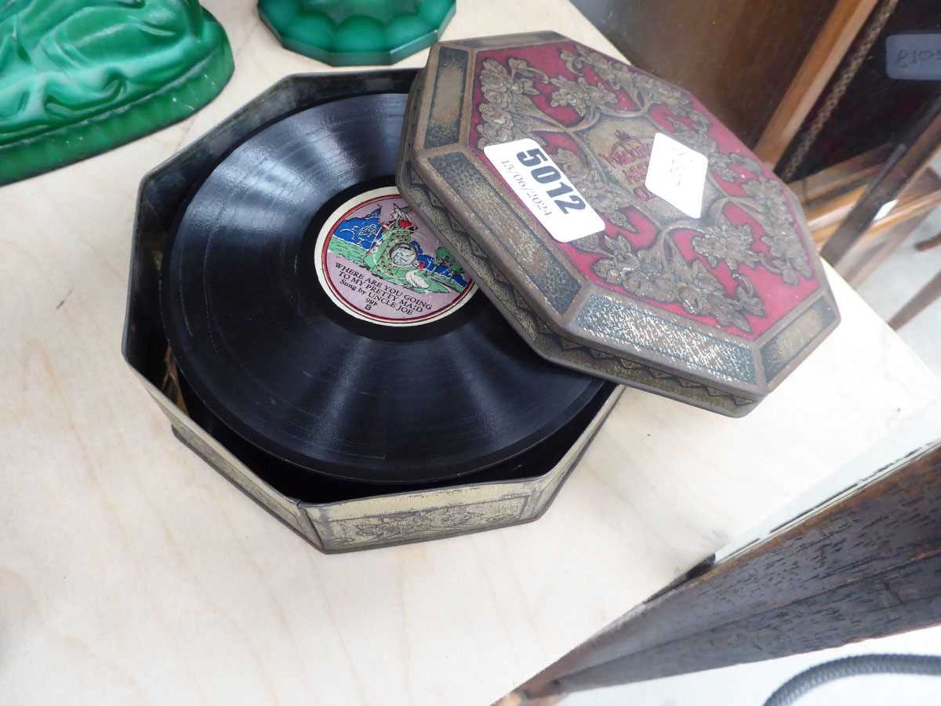 Vintage tin with children's vinyl records