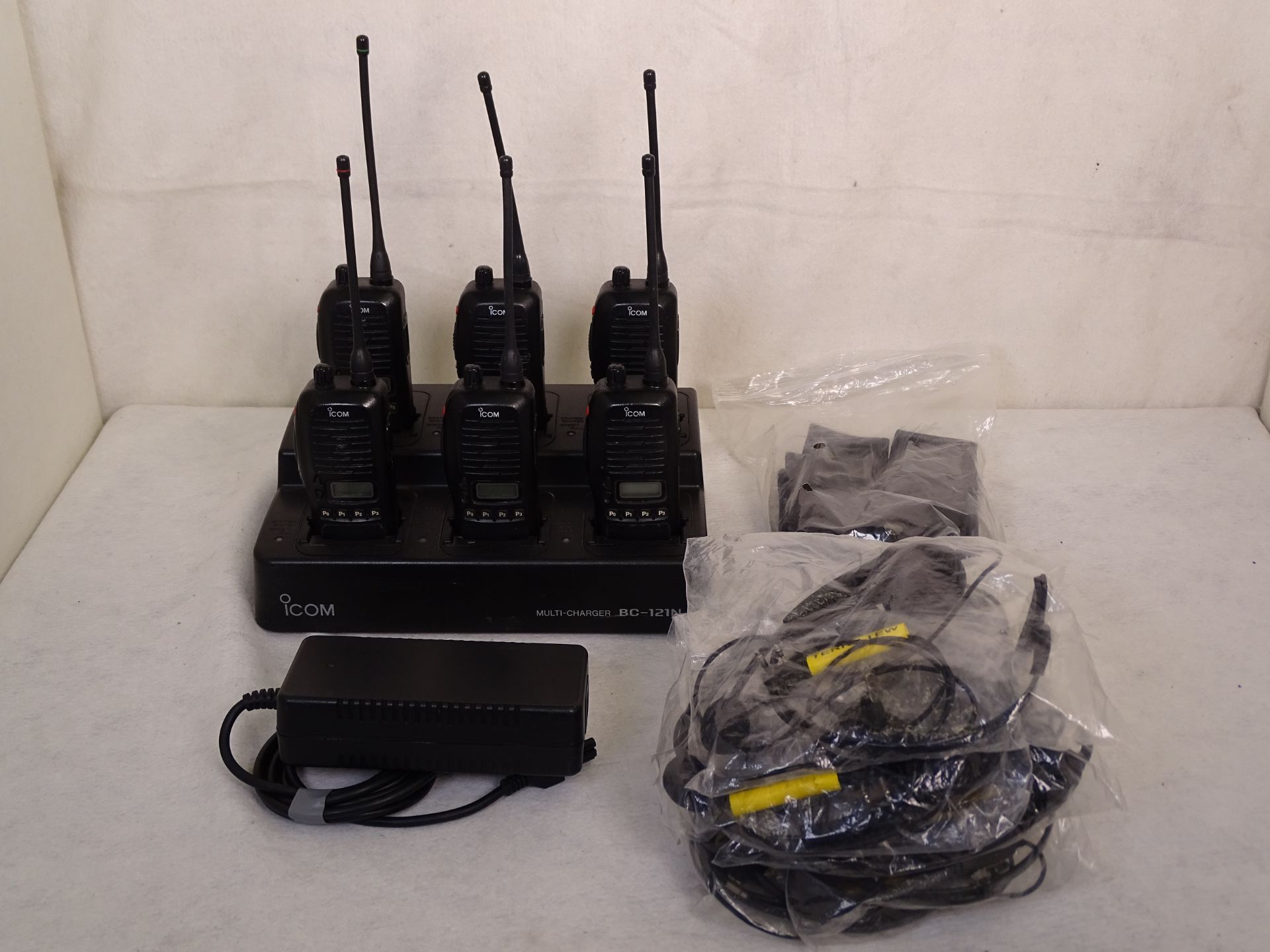 A 6 way ICOM IC-F4GS UHF Hand Portable Walkie Talkie Kit each with ...