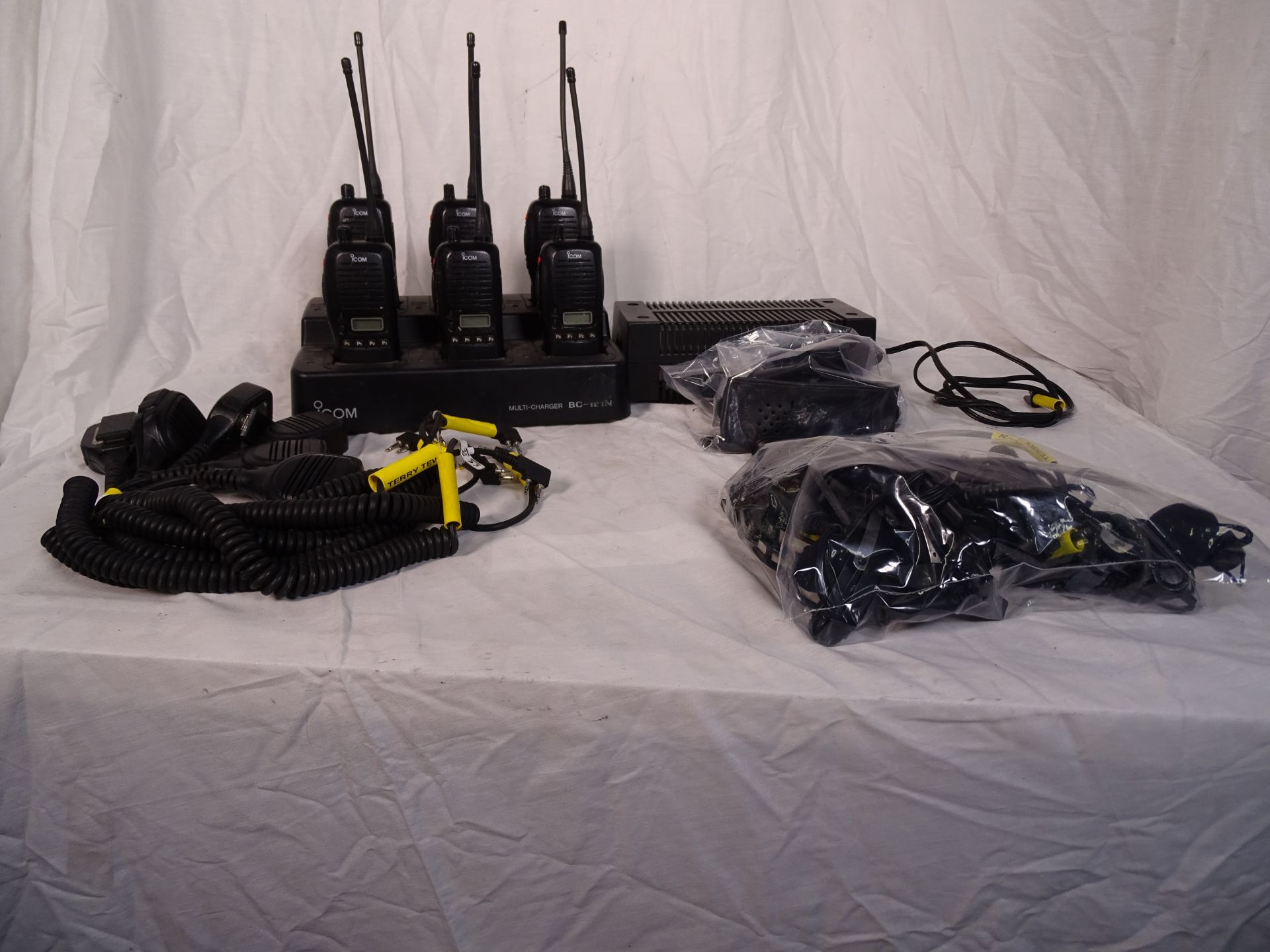 A 6 way ICOM IC-F4GS UHF Hand Portable Walkie Talkie Kit each with ...
