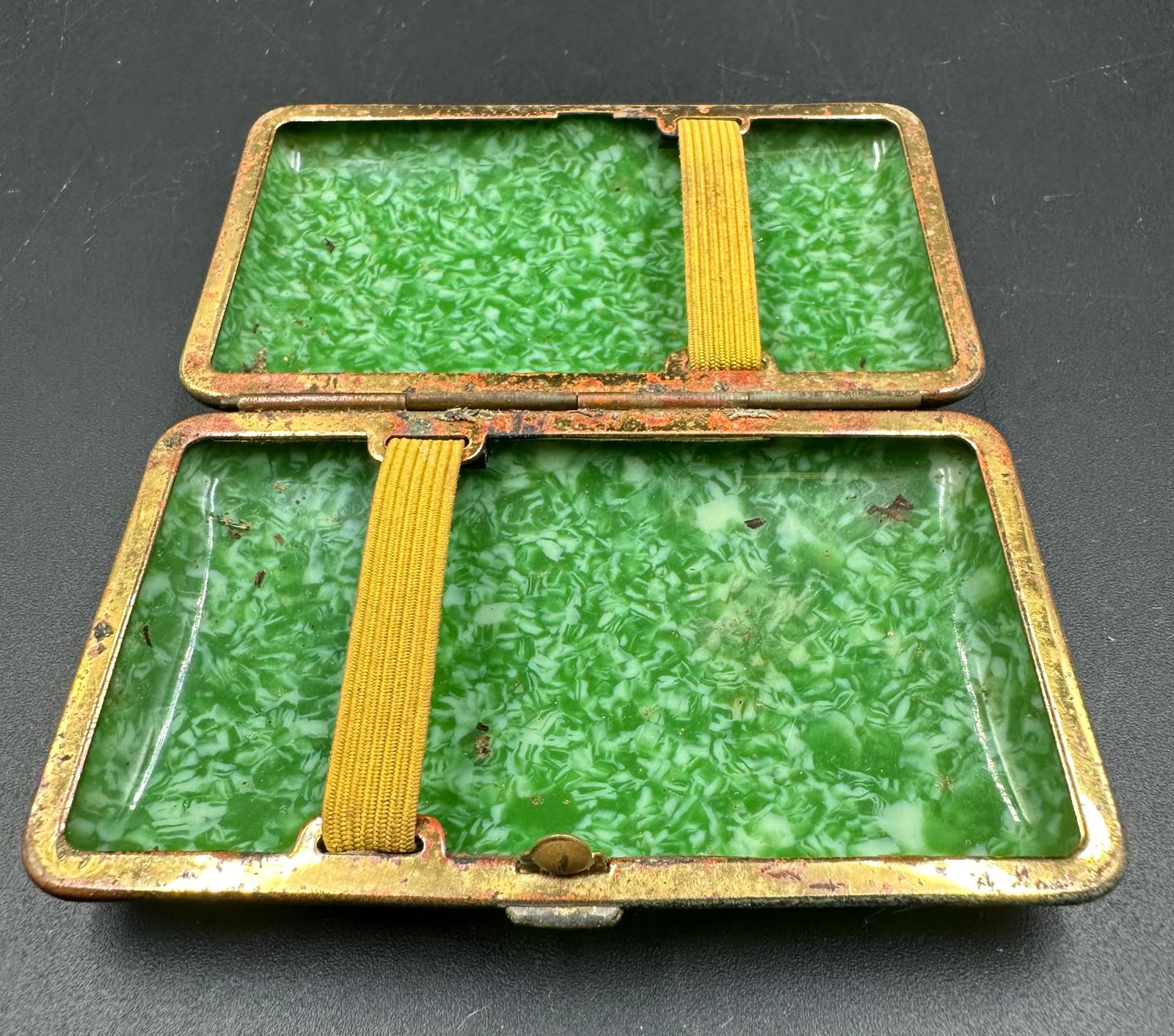 A vintage green mottled marble or shagreen effect celluloid cigarette ...