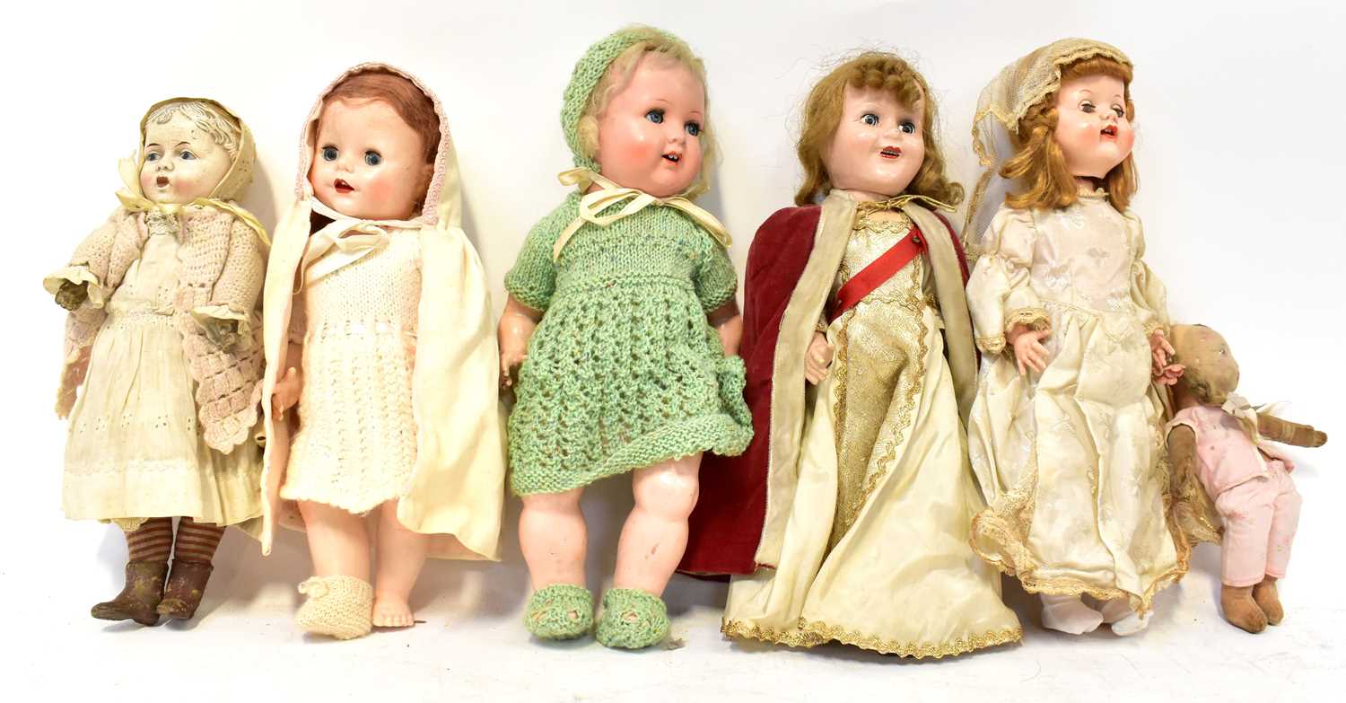 Six dolls, including a composite headed doll with hand painted features ...