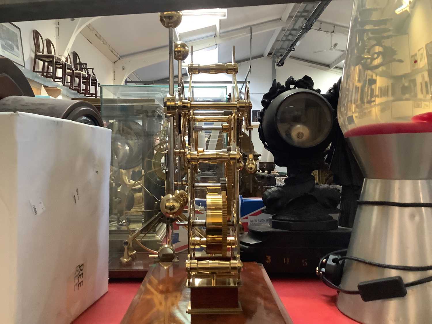 SINCLAIR HARDING & CO; a brass 'Mr. Harrison's Sea Clock' skeleton ...