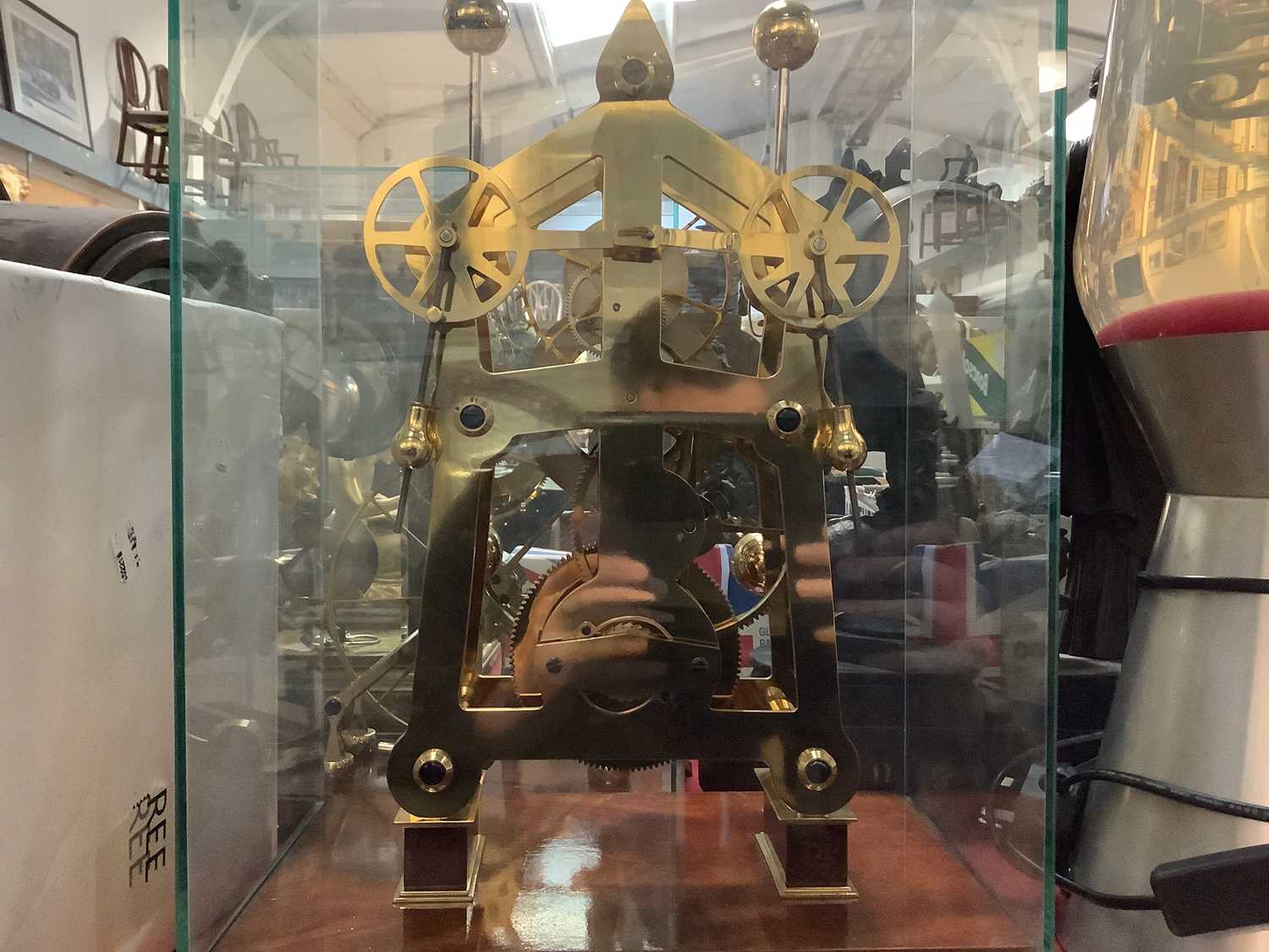 SINCLAIR HARDING & CO; a brass 'Mr. Harrison's Sea Clock' skeleton ...
