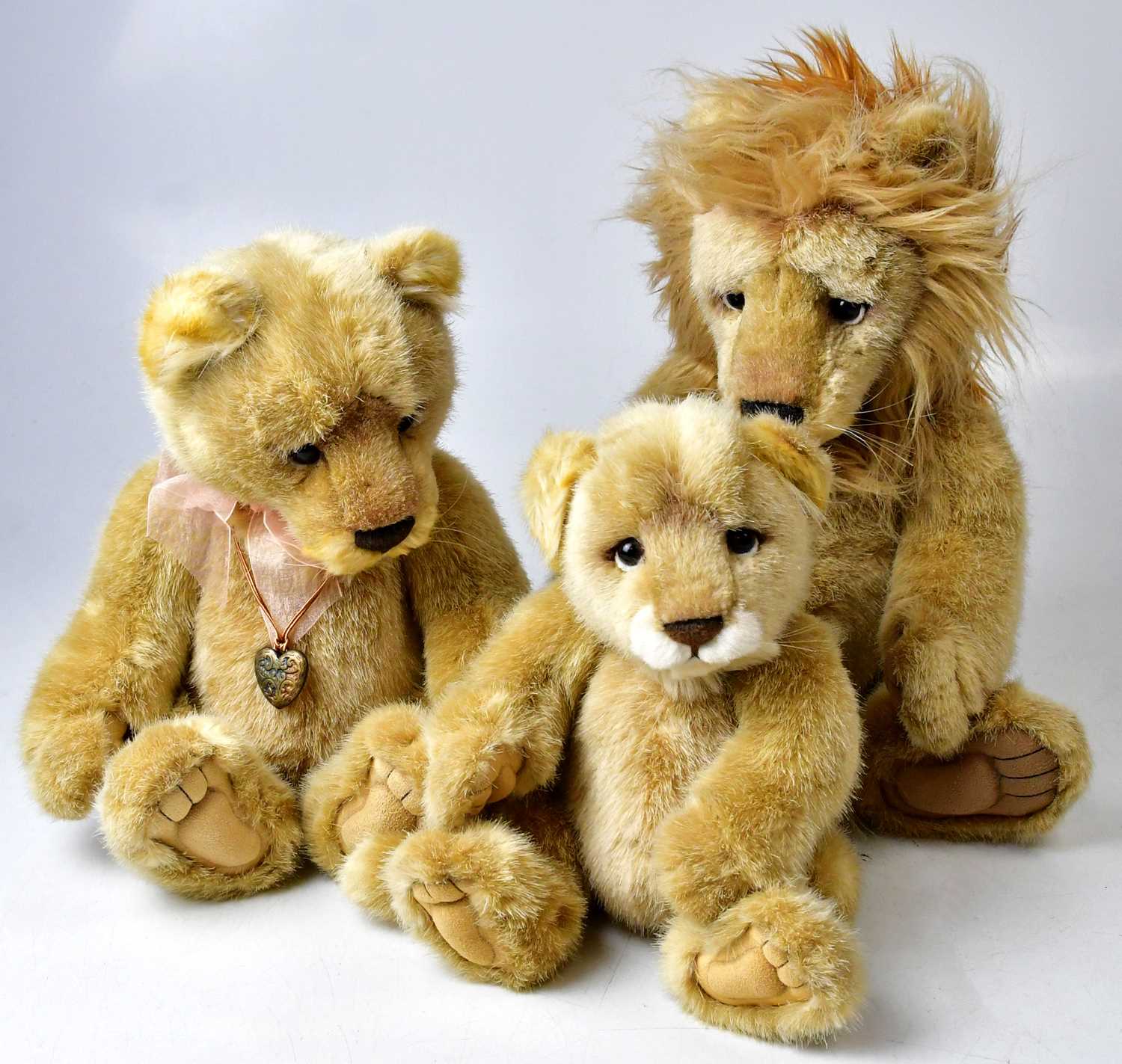 CHARLIE BEARS; three collectors' bears, a family of lions comprising ...