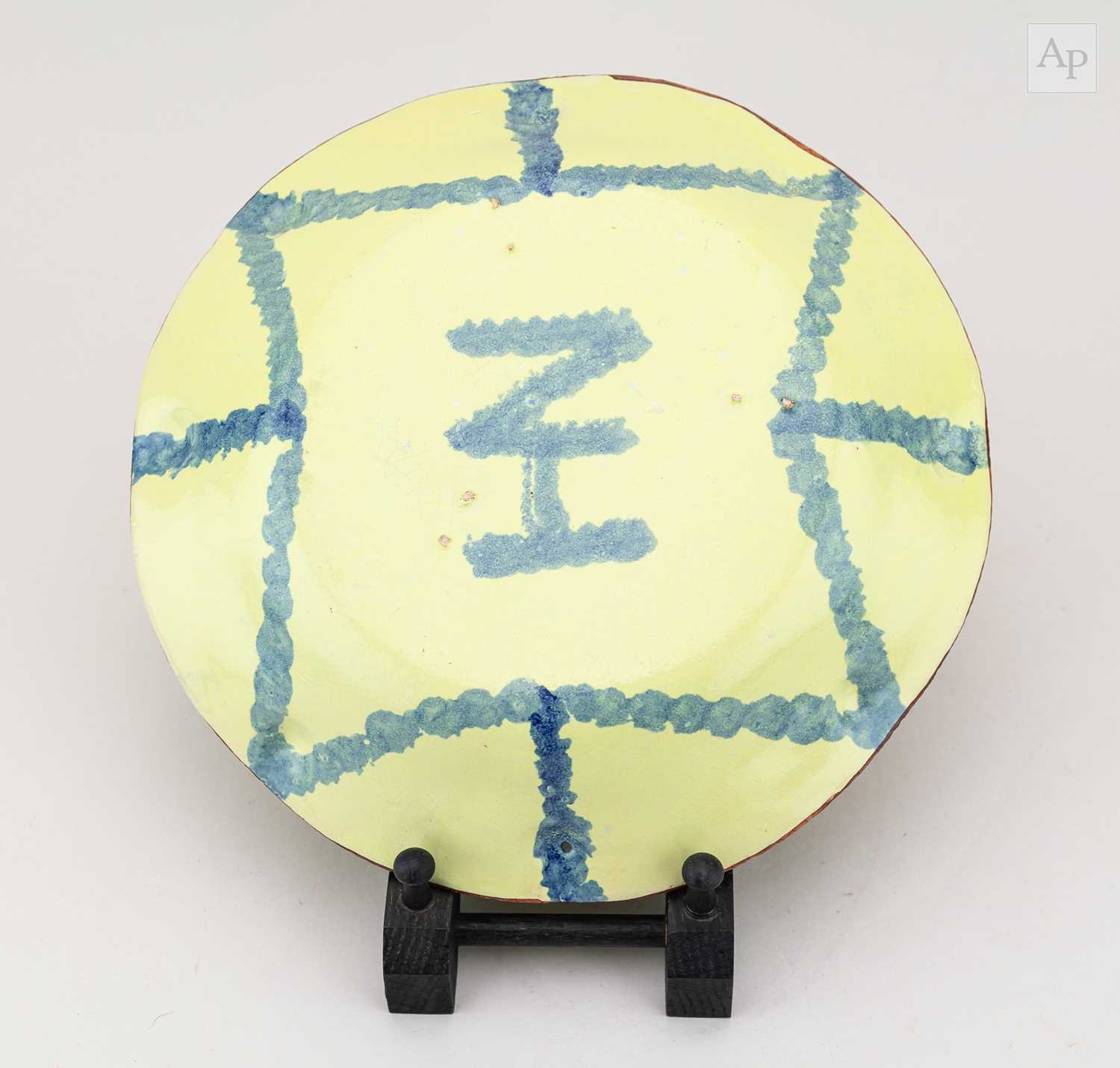 HYLTON NEL (born 1941); a tin glazed earthenware dish depicting a ...
