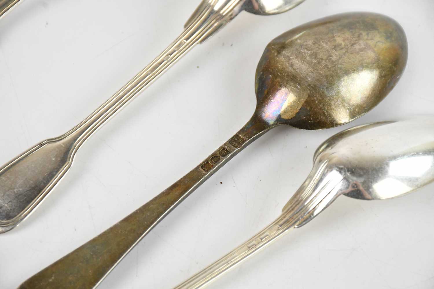 JOHN ROUND; five hallmarked silver egg spoons, Sheffield 1897, two ...