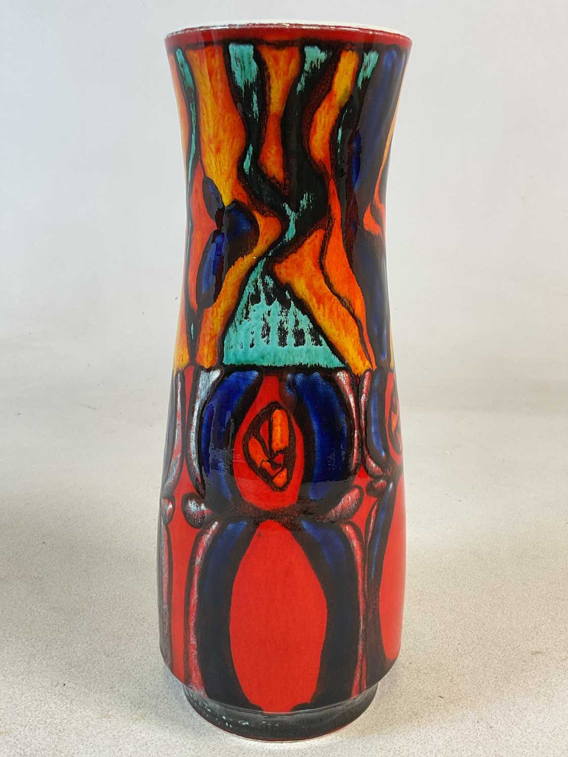 POOLE POTTERY; a large brightly coloured slightly flared cylindrical ...