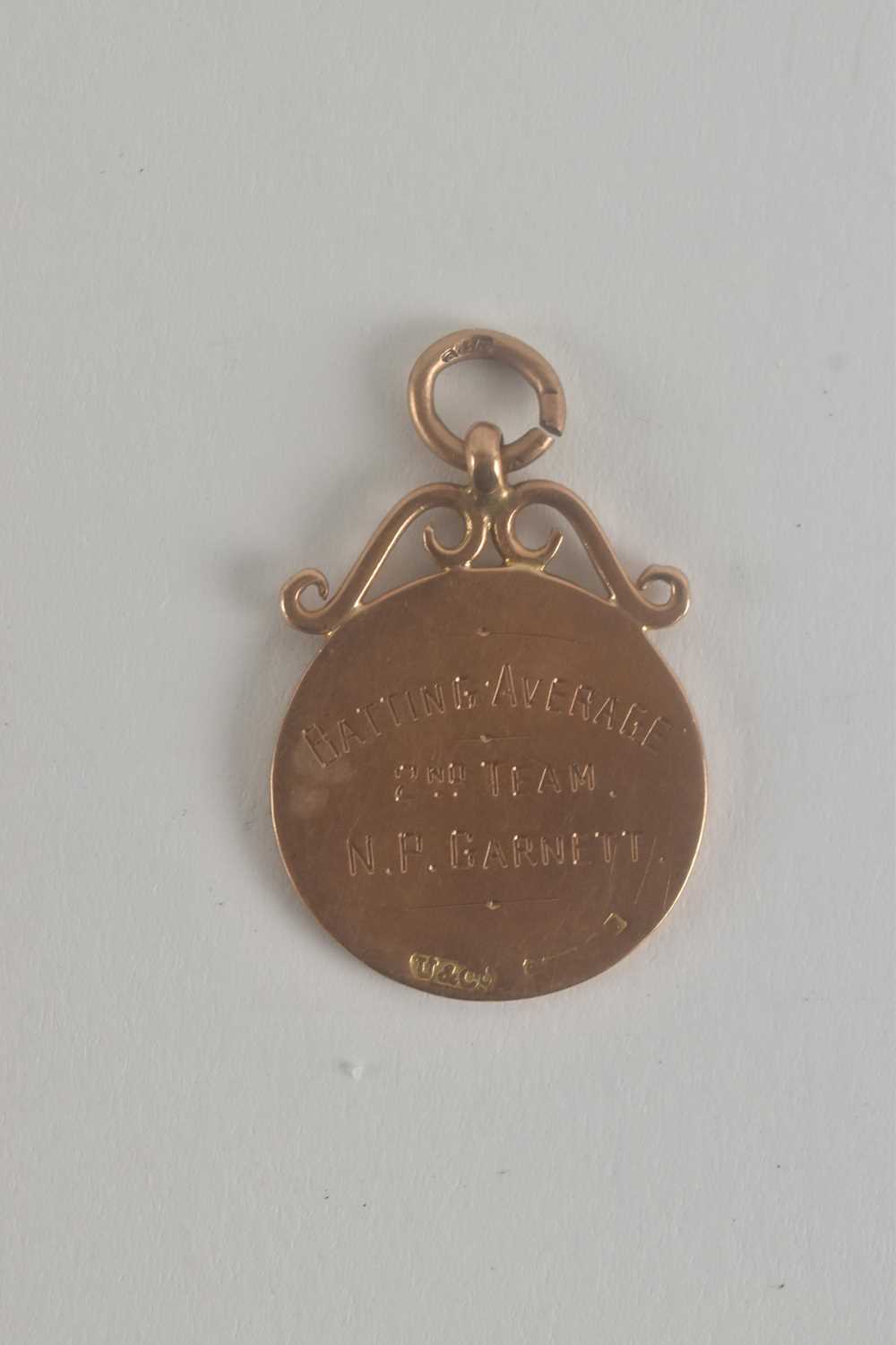 A 9ct gold prize fob for the Thackley Cricket Club 1922, awarded to N ...
