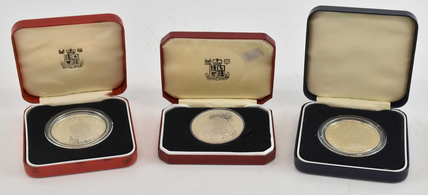 ROYAL MINT; three silver proof commemorative coins comprising a three ...