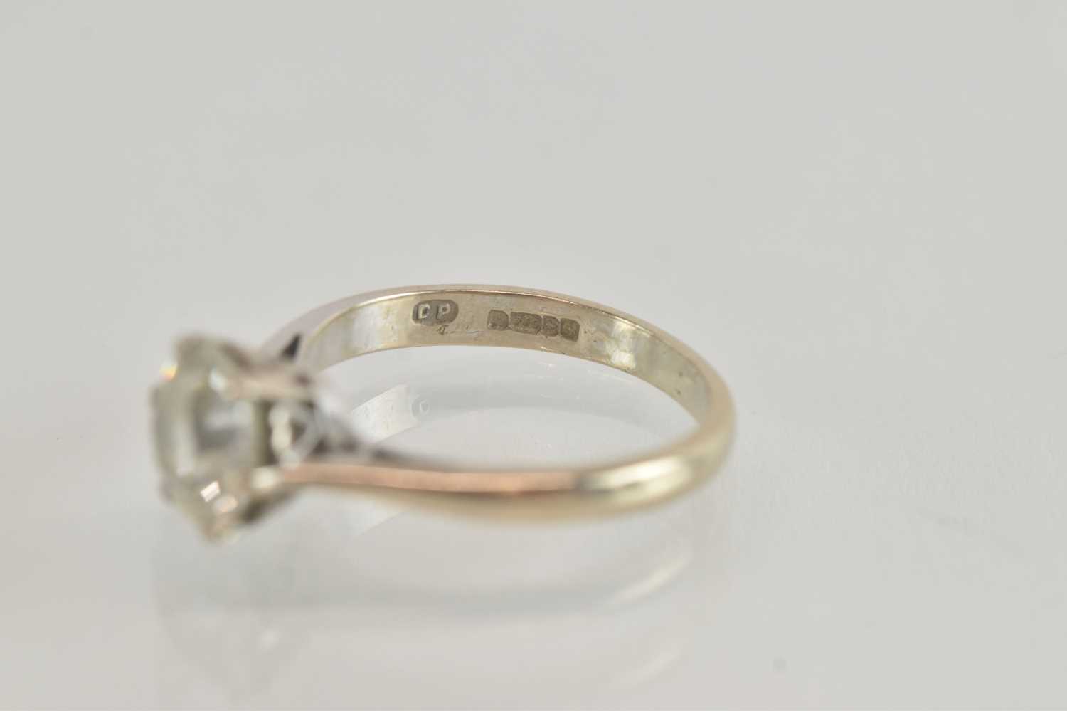 An 18ct white gold diamond solitaire ring, the single claw set ...