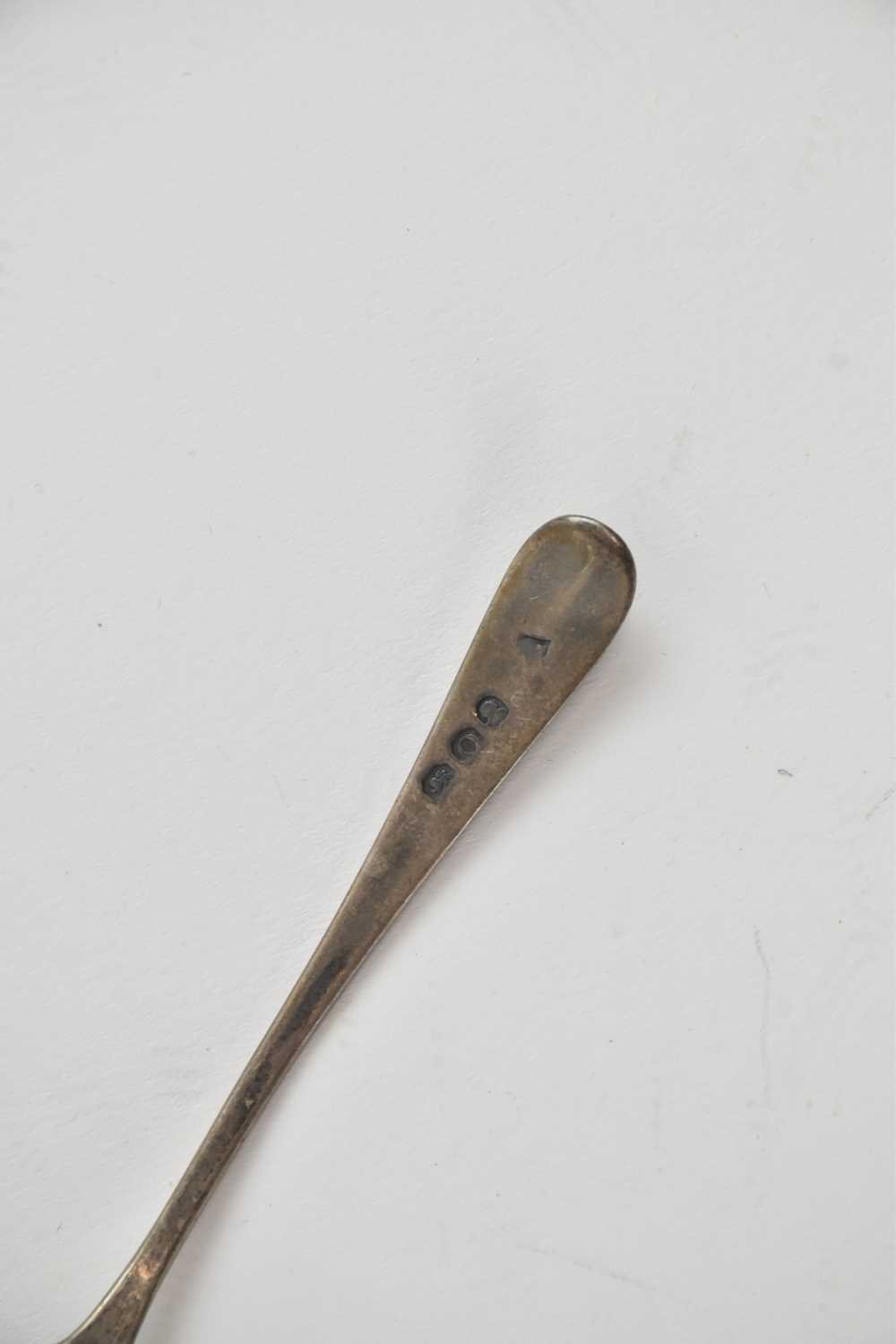 Four mixed hallmarked silver teaspoons, one example a souvenir of the ...