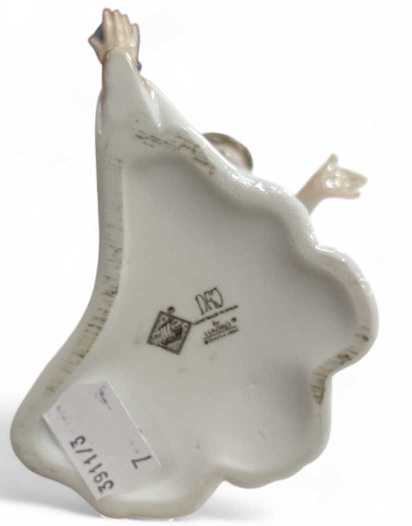 NAO; a collection of seven assorted porcelain figures of young ladies ...