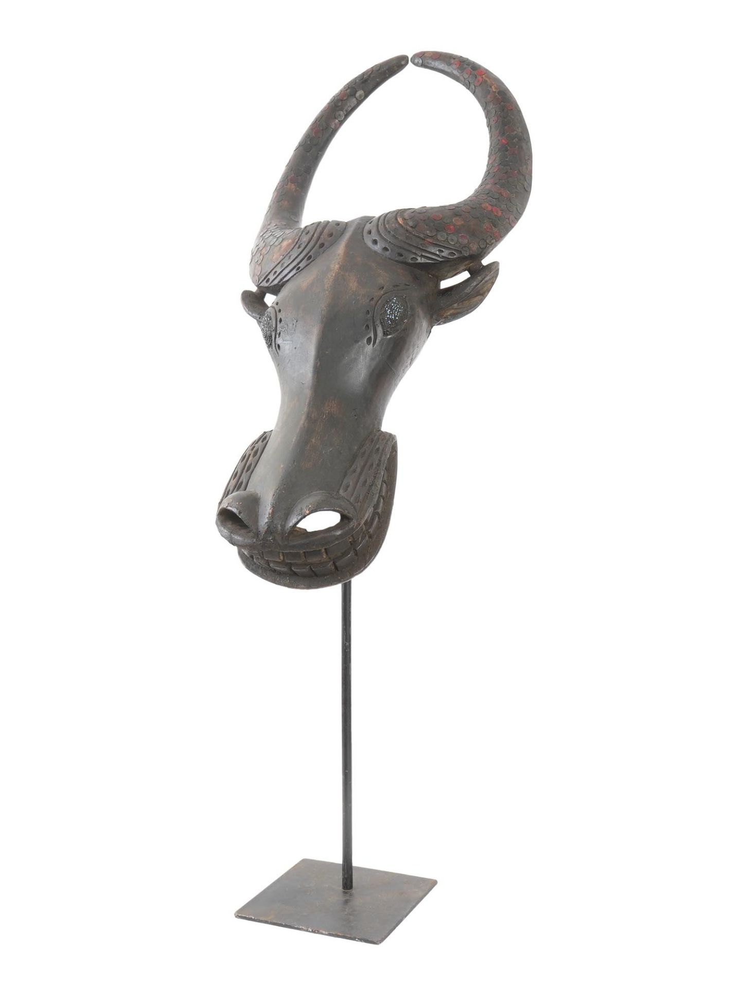 A fine Bamileke people buffalo helmet mask from Cameroon, a significant ...