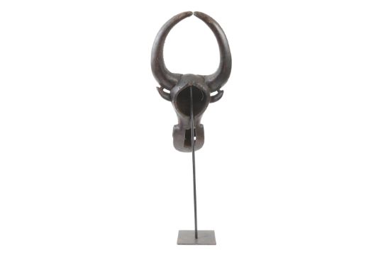 A fine Bamileke people buffalo helmet mask from Cameroon, a significant ...