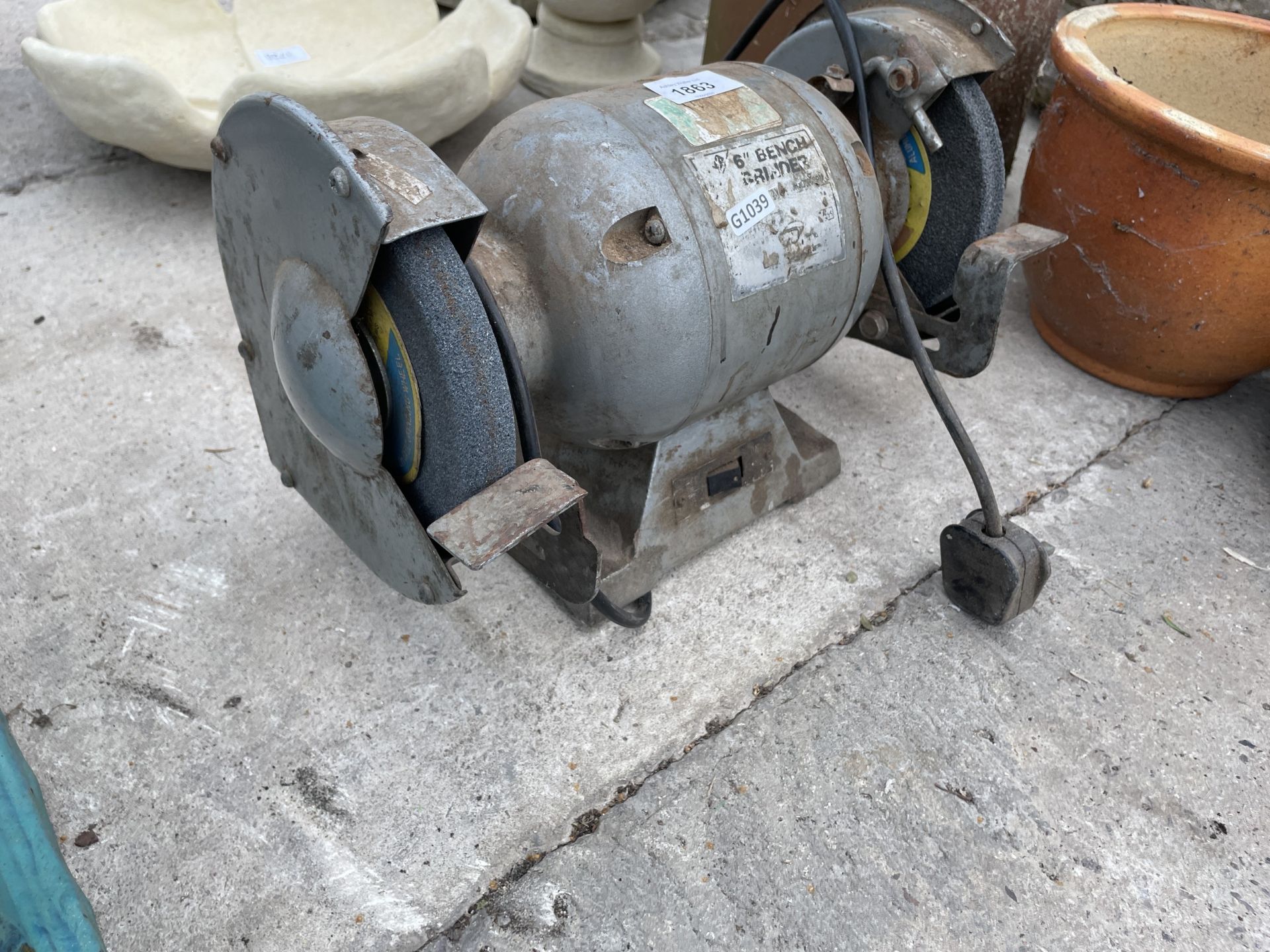 A 6" DOUBLE SIDED BENCH GRINDER
