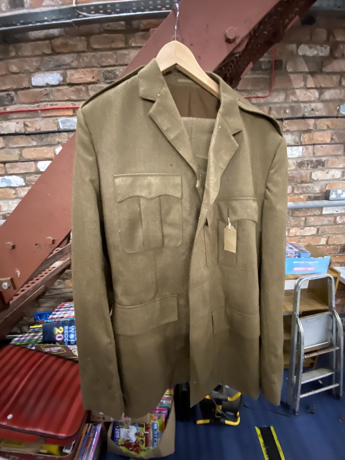 A BRITISH ARMY UNIFORM, COMPRISING JACKET AND TROUSERS