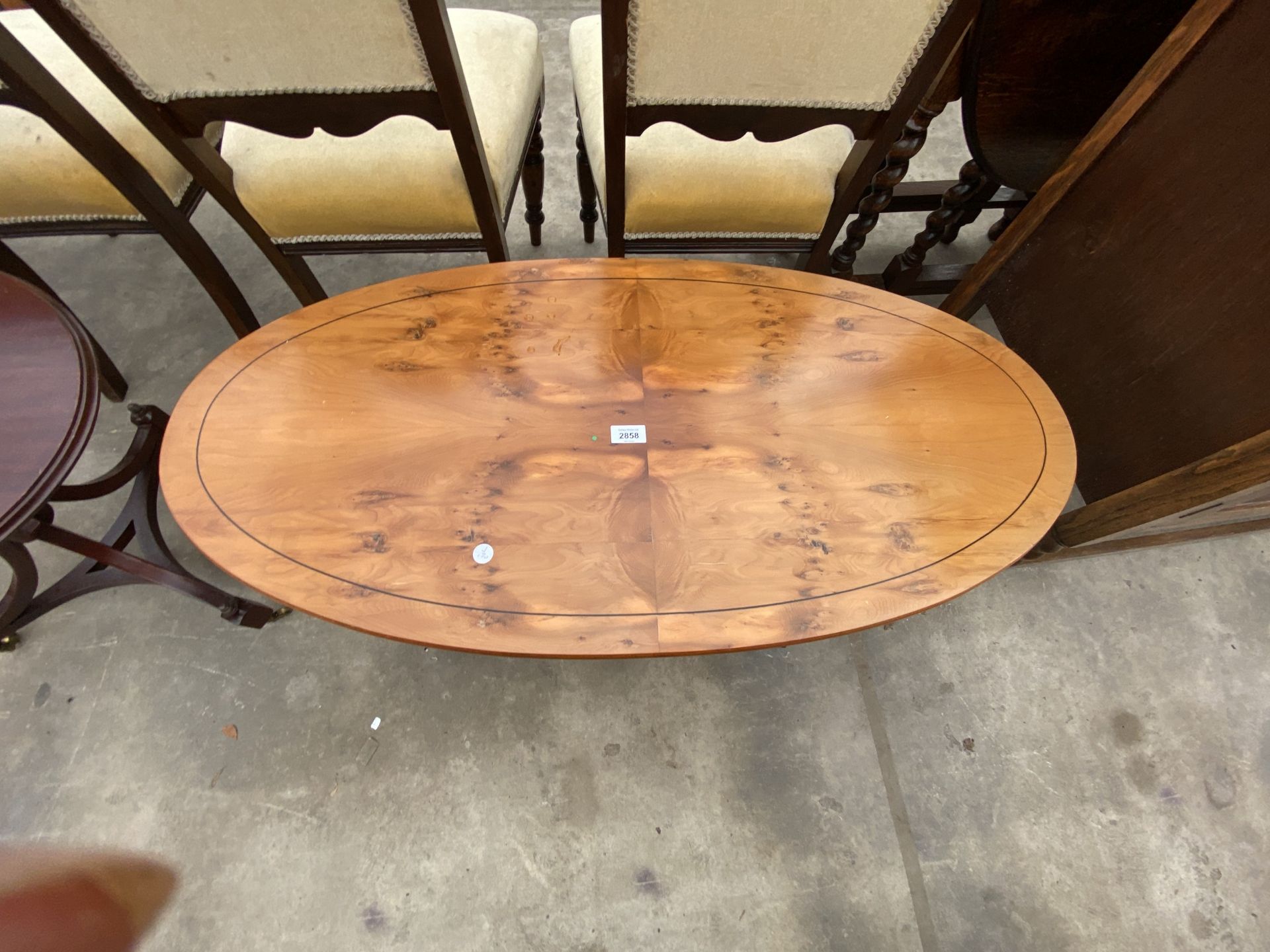 A MIDICY REPRODUCTIONS YEW WOOD OVAL COFFEE TABLE, 39" X 19", ON ...