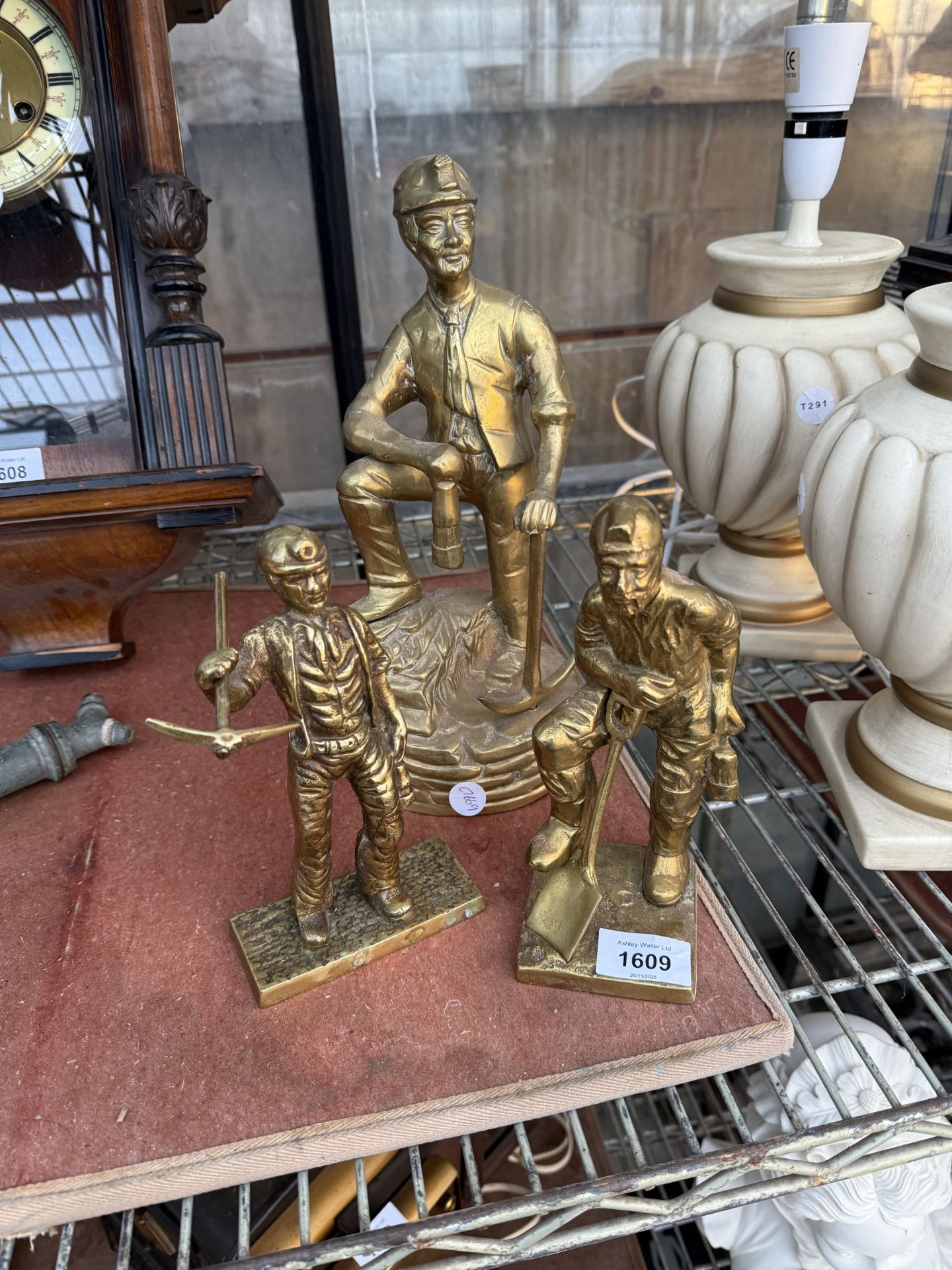 THREE VINTAGE BRASS FIGURES OF MINERS