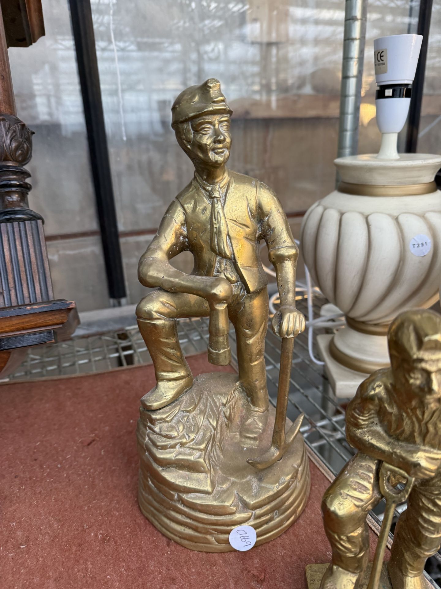 THREE VINTAGE BRASS FIGURES OF MINERS