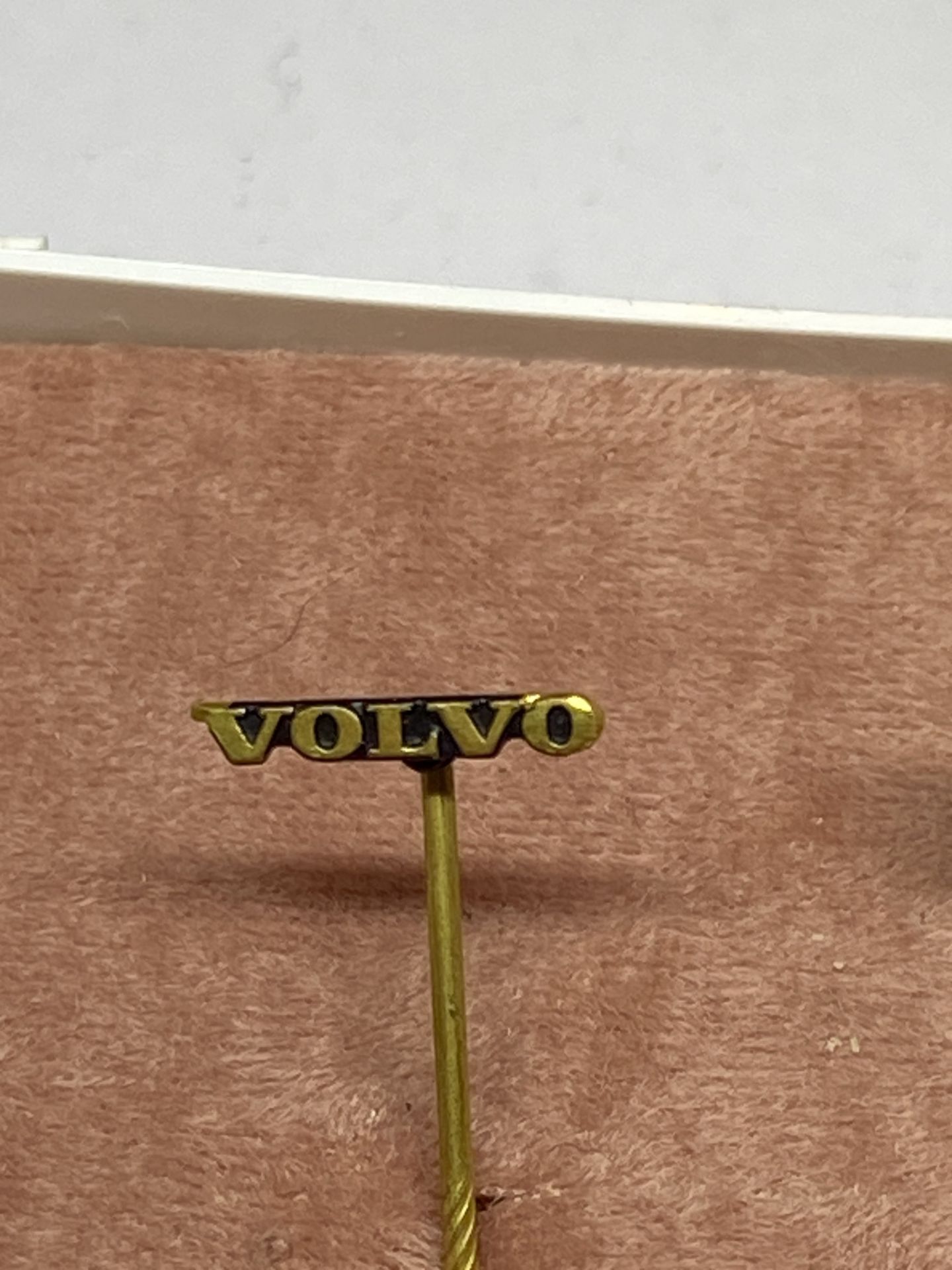 TWO VOLVO PIN BADGES
