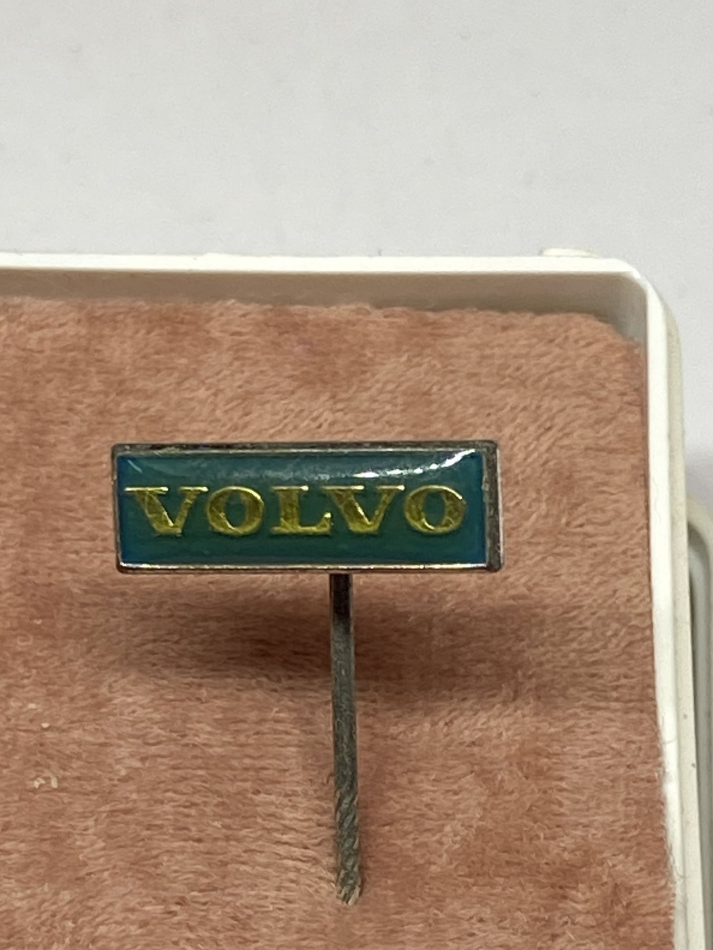 TWO VOLVO PIN BADGES
