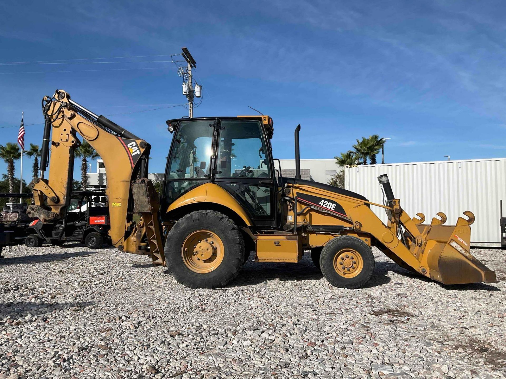 CATERPILLAR BACKHOE MODEL 420E, DIESEL POWERED; LOADER LIFT MAX CAP ...