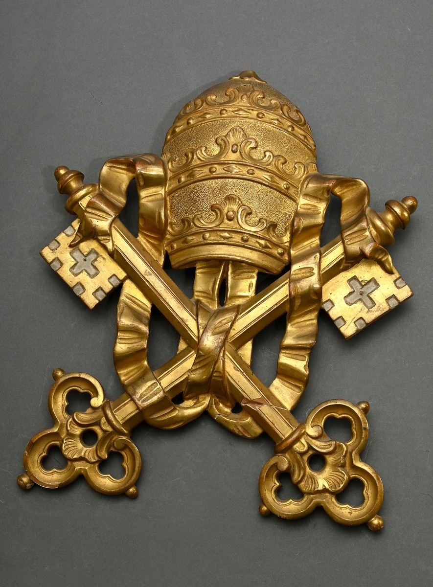 Papal emblem consisting of crossed keys and tiara, carved wood and ...