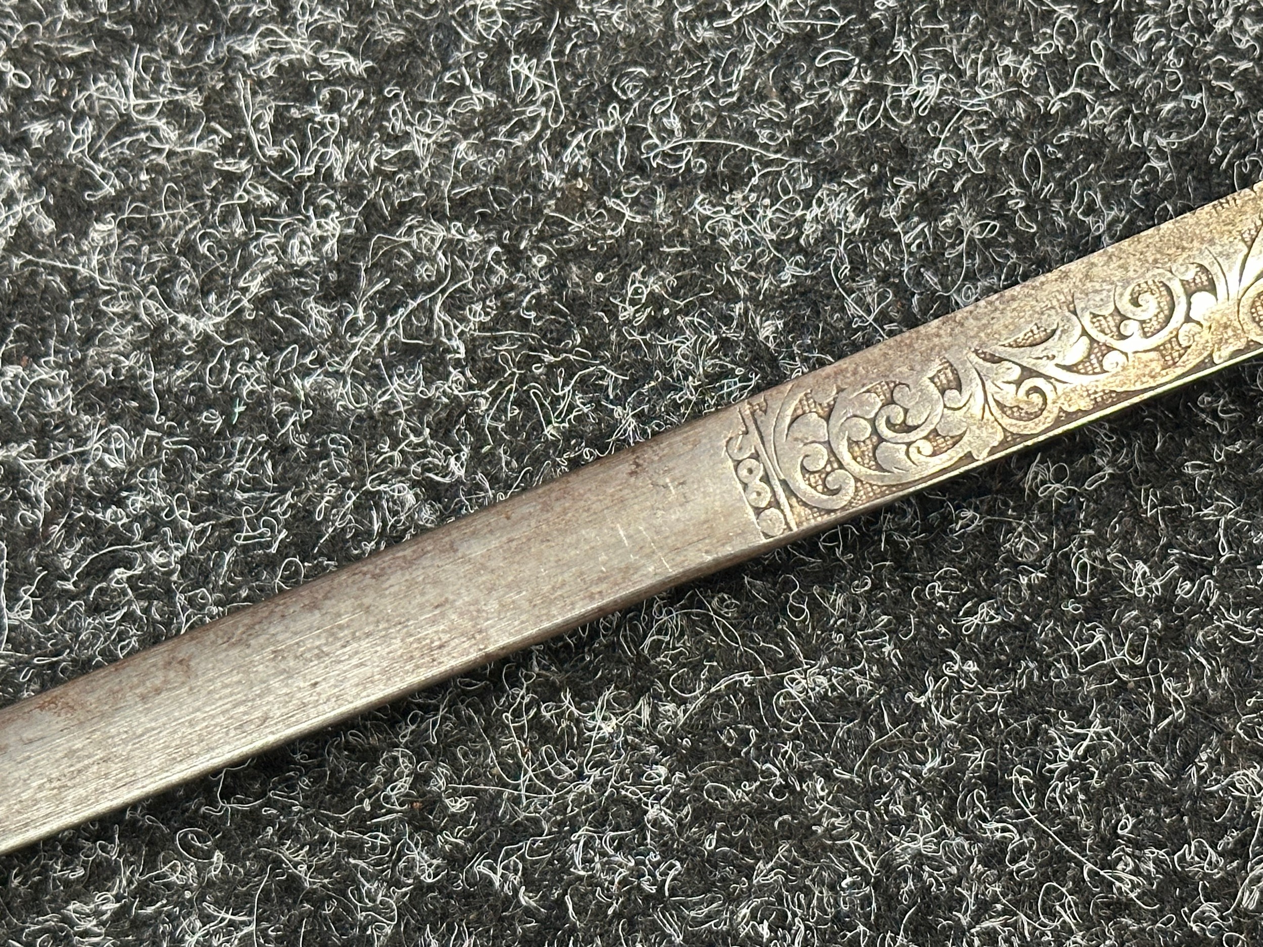 A collection of three Rapiers: One with decorated etched double edged ...