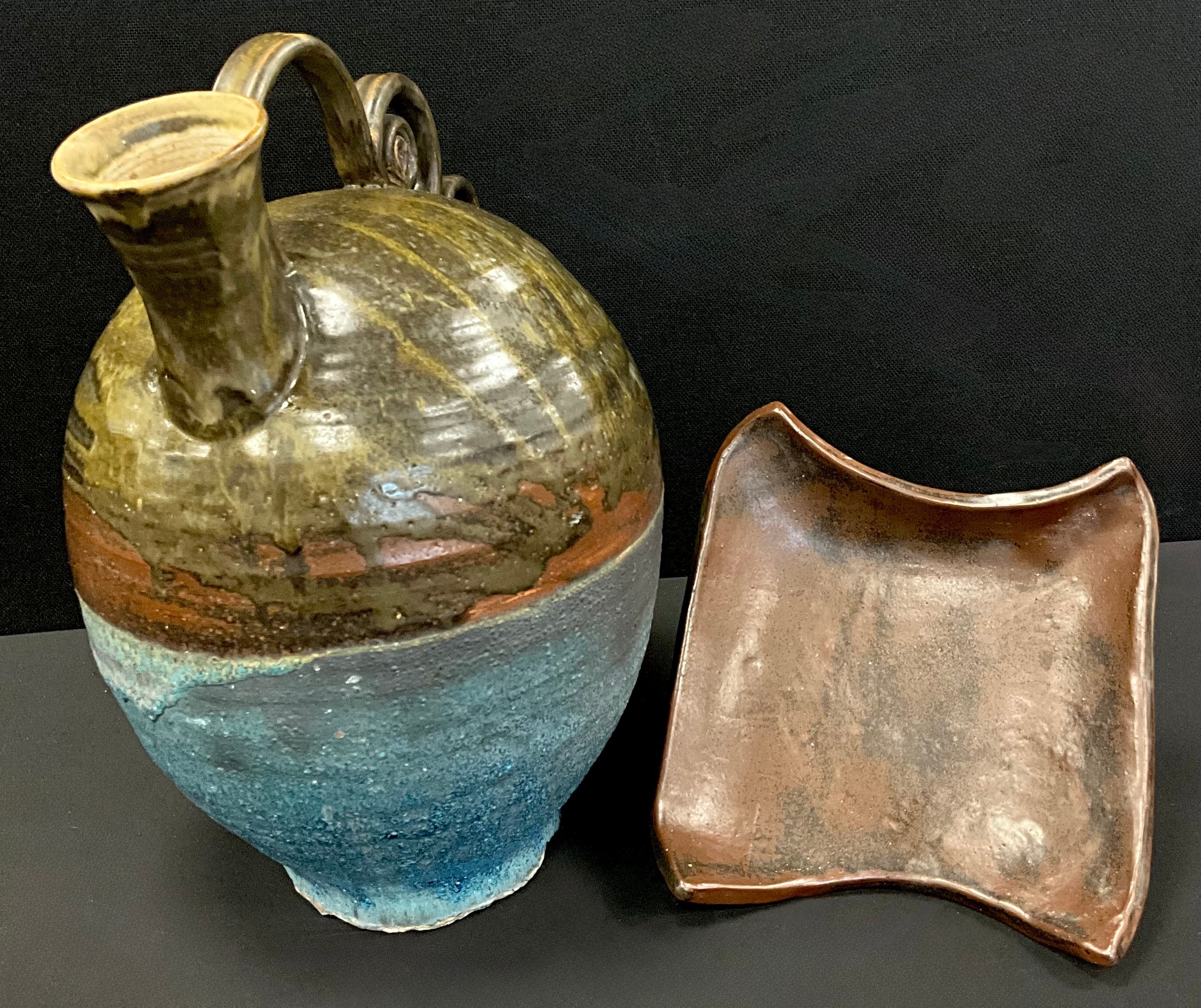 A large Scottish Hassall studio pottery flagon, eccentric looping ...