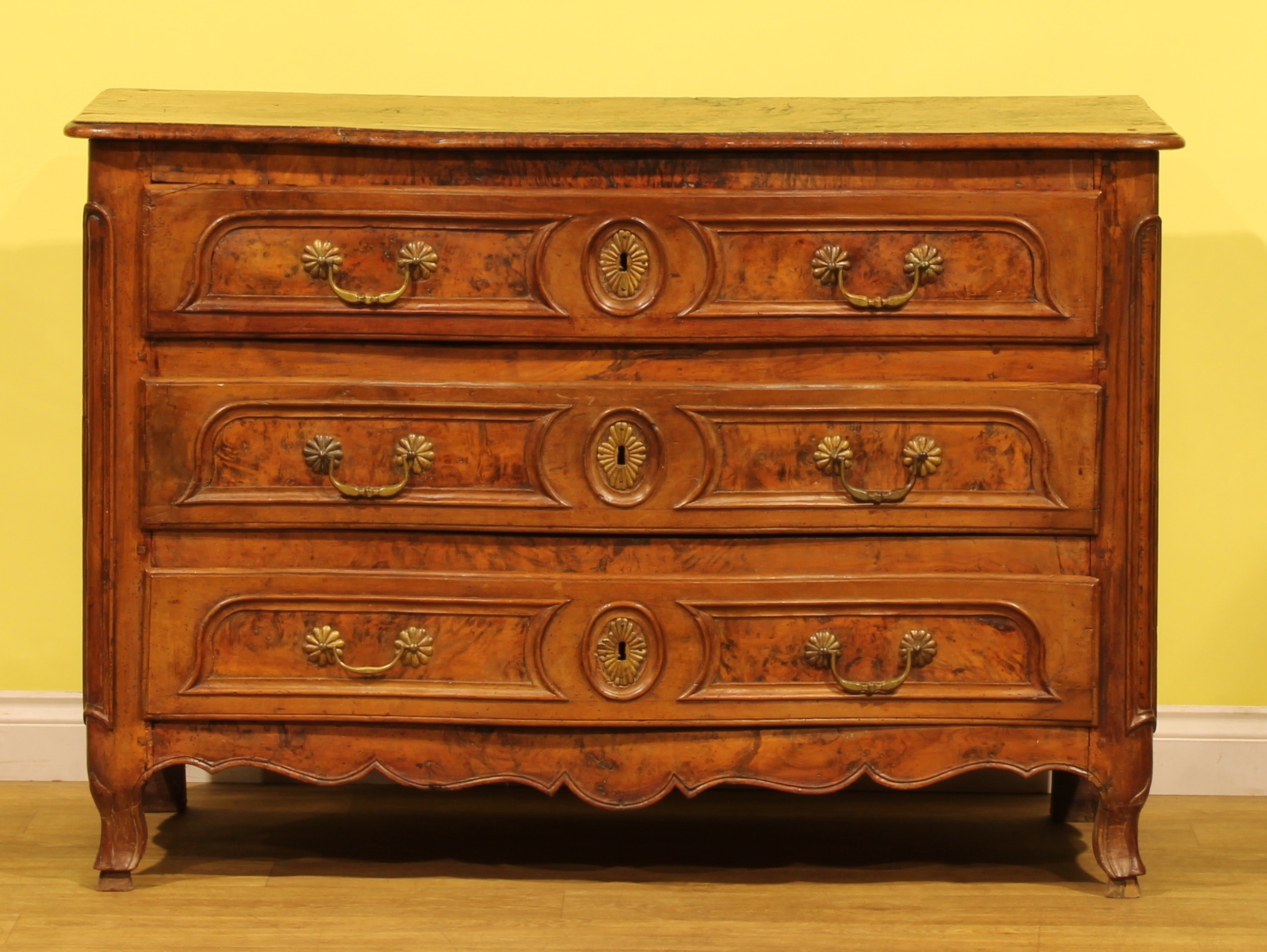 An 18th century French Provincial elm, burr and fruitwood serpentine ...