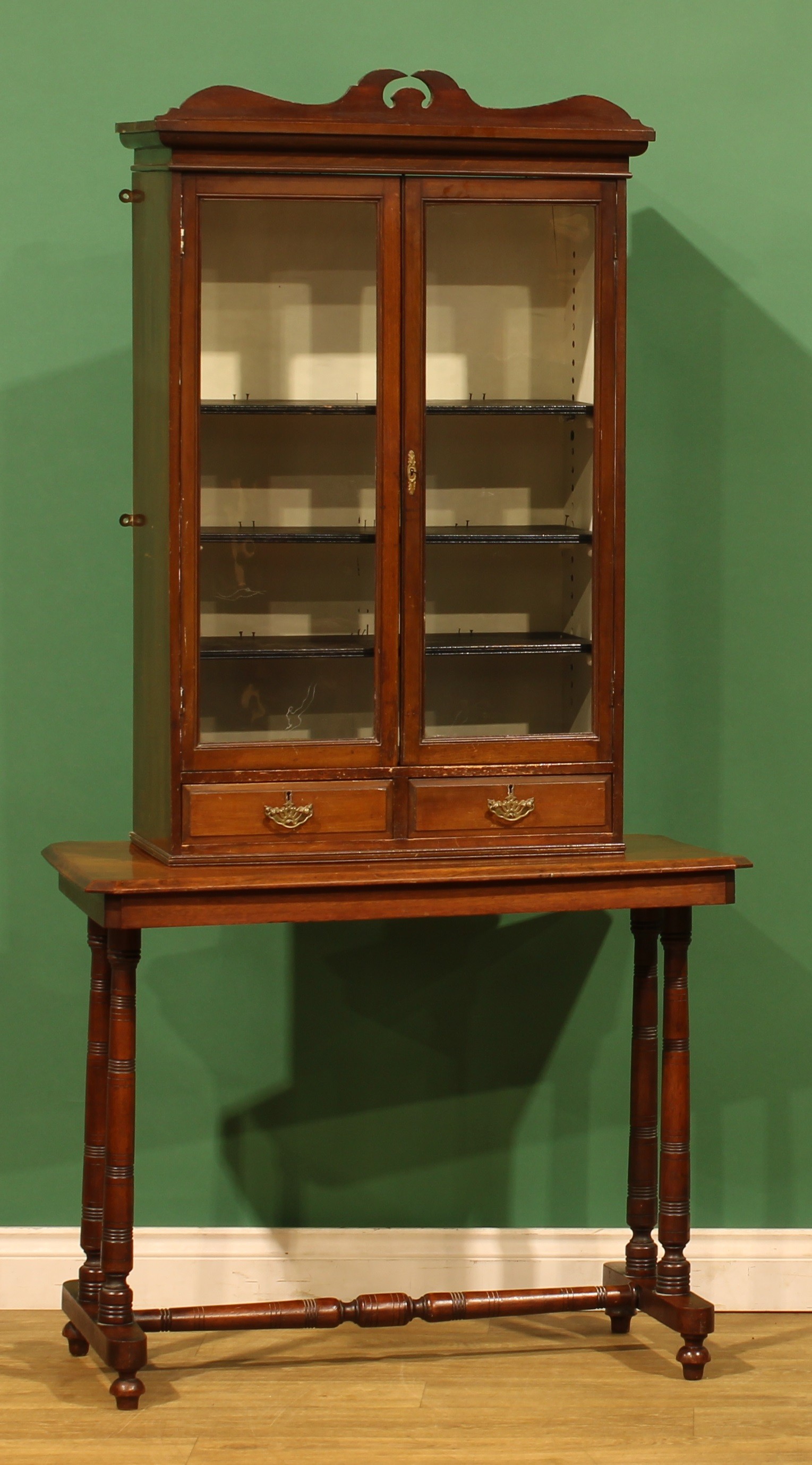 A Victorian walnut stretcher table, c.1880; a Victorian collector’s ...