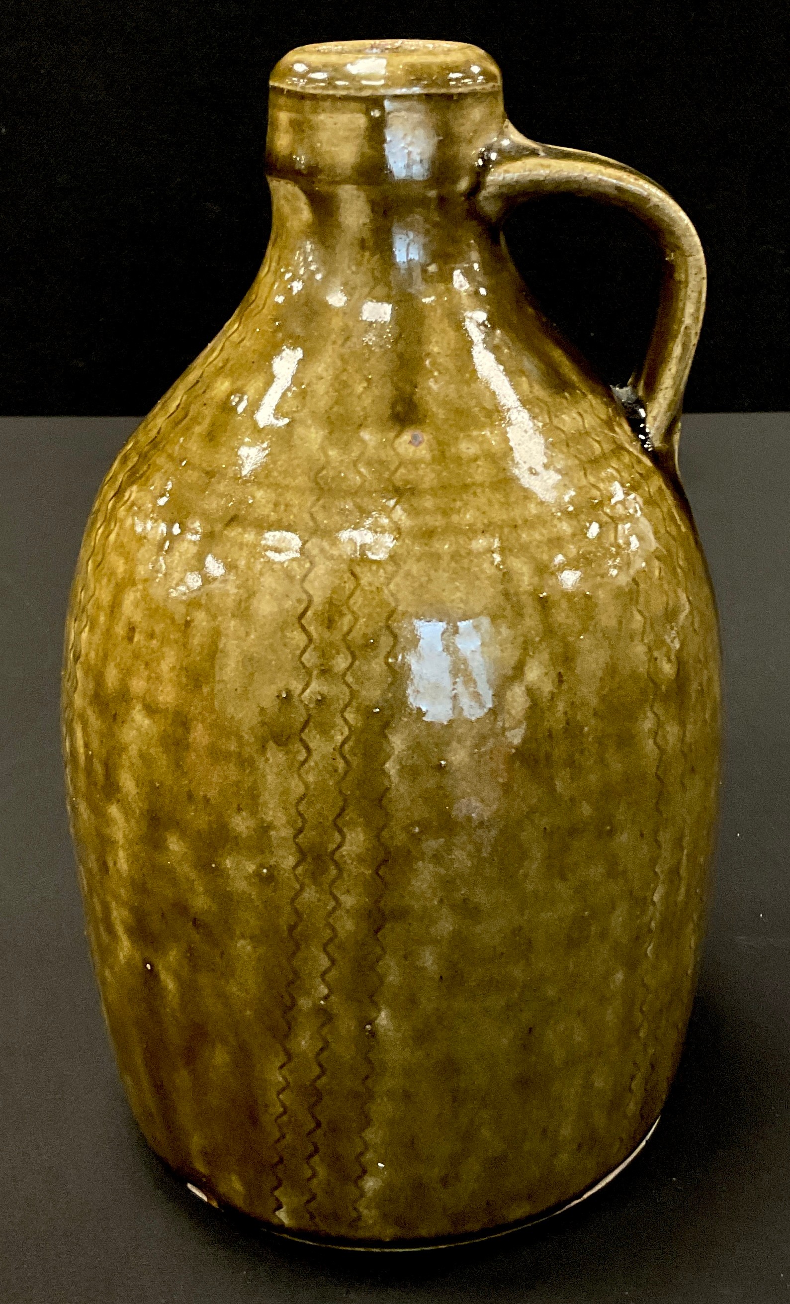 Michael Cole - a stoneware cider flagon, banded and incised decoration ...