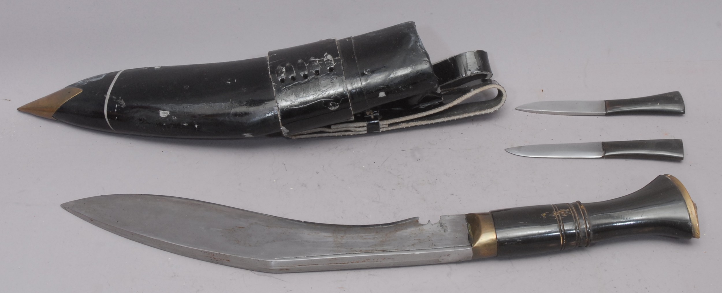 Tribal Art - a Nepalese kukri knife, the blade engraved with floral ...