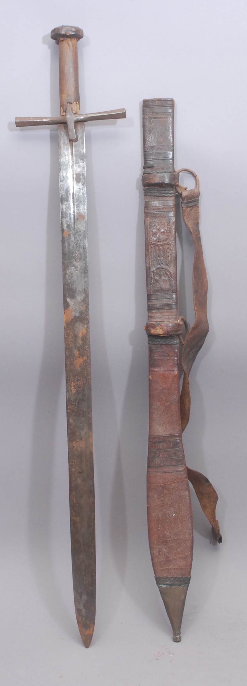 Tribal Art - A Sudanese Kaskara sword, the 65cm double edged, single ...