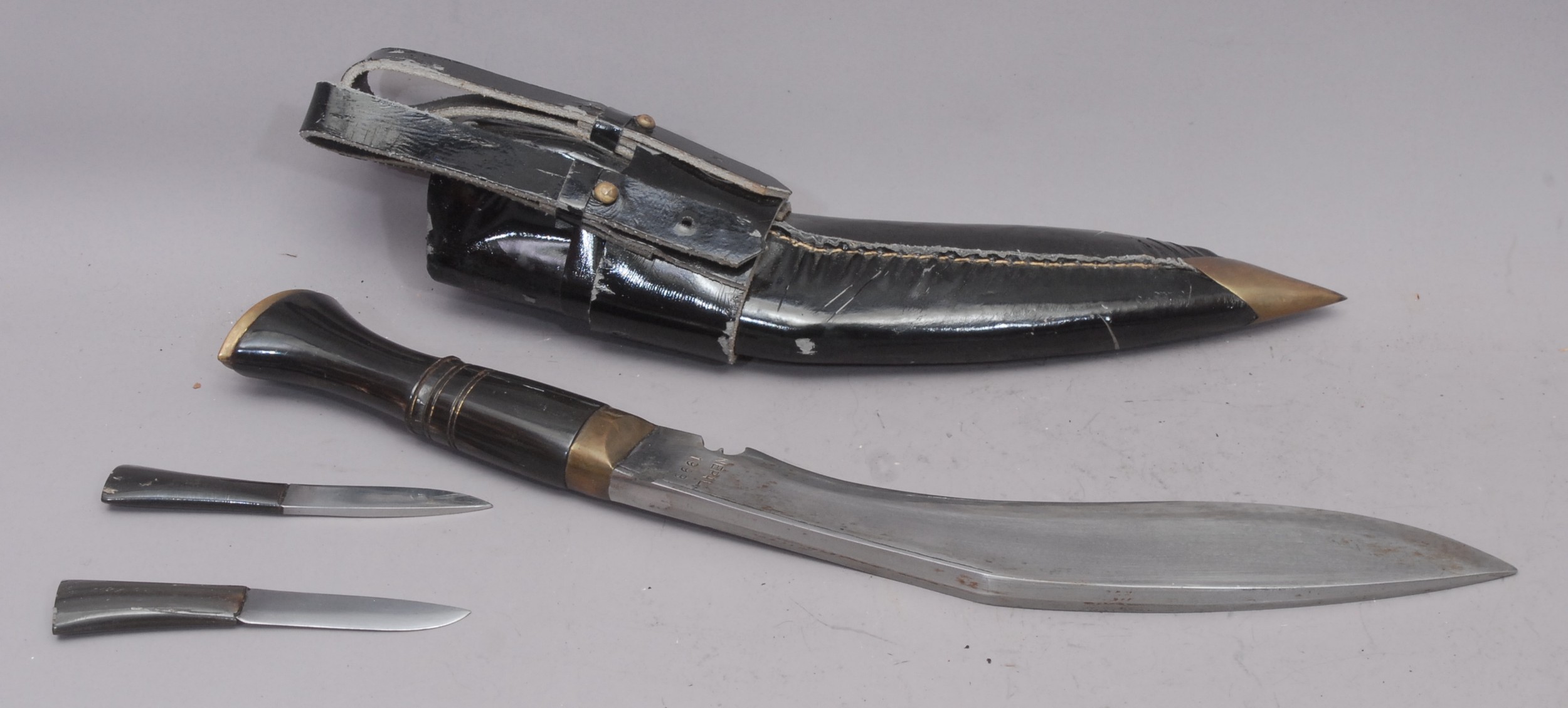 Tribal Art - a Nepalese kukri knife, the blade engraved with floral ...