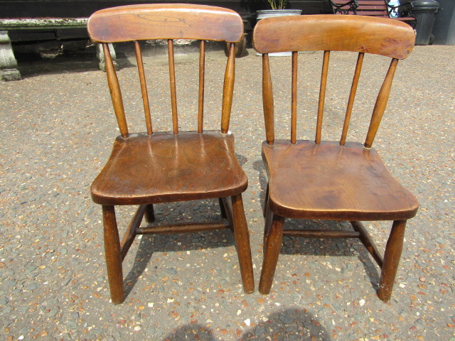 2 vintage stick back children's chairs