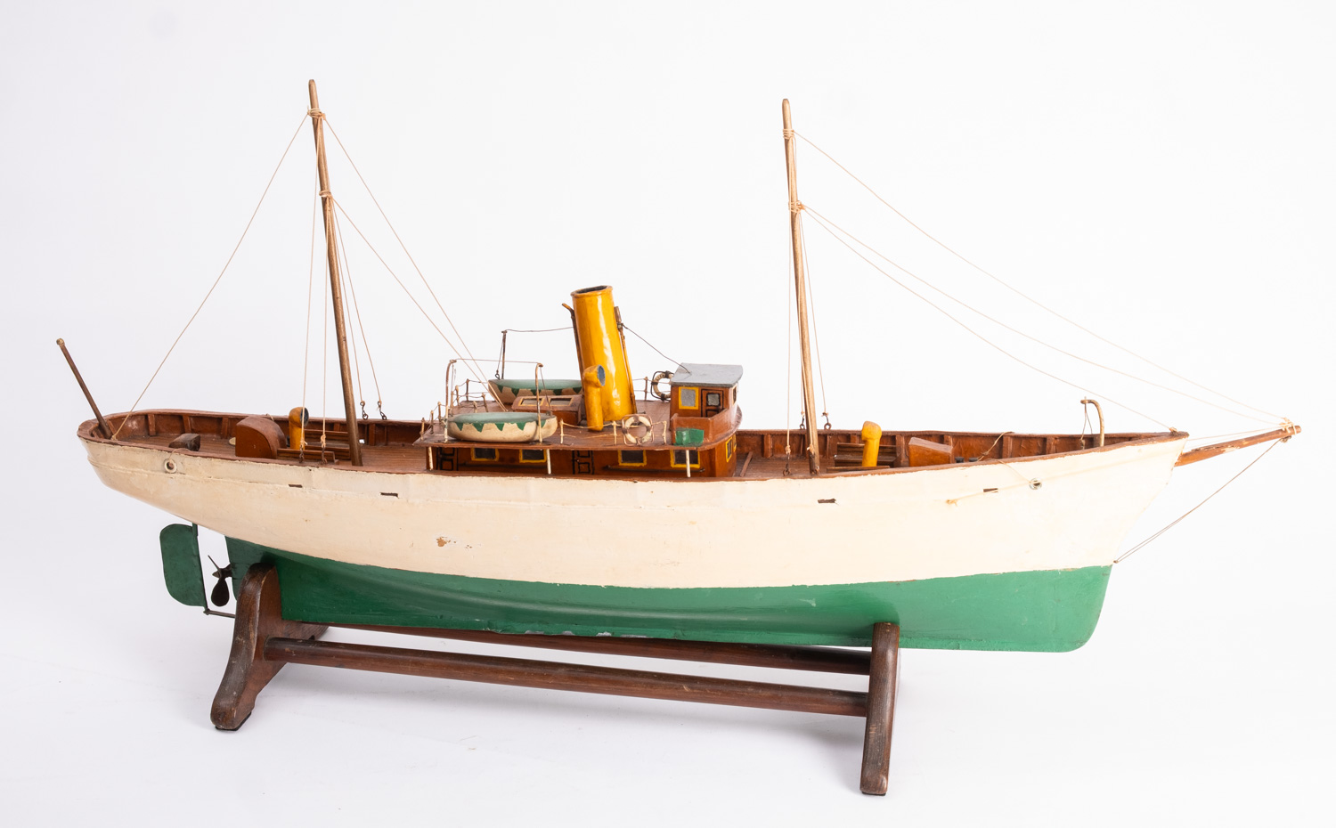 An early 20th century scale model of a steam yacht, with rigged masts ...